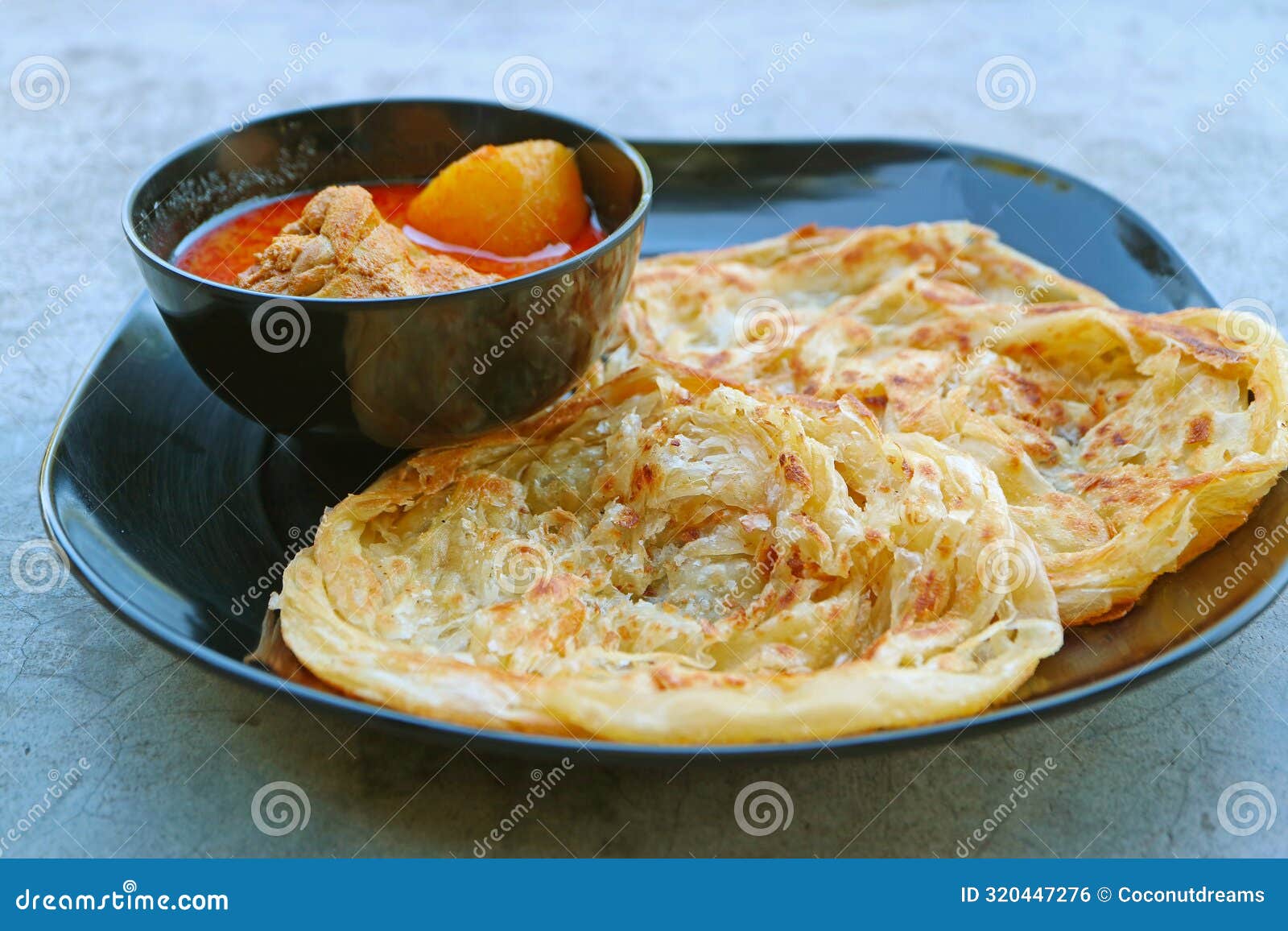 Spicy Indian Chicken Curry Served with Roti Flatbread Stock Photo ...