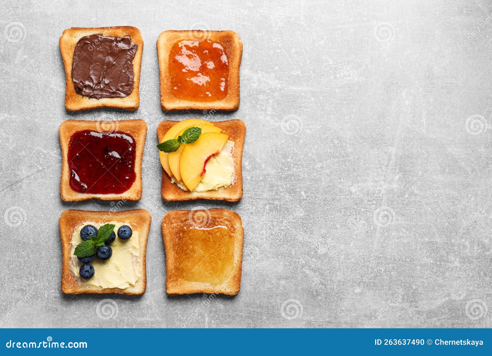 Tasty Toasts with Different Spreads and Fruits on Light Grey Table ...
