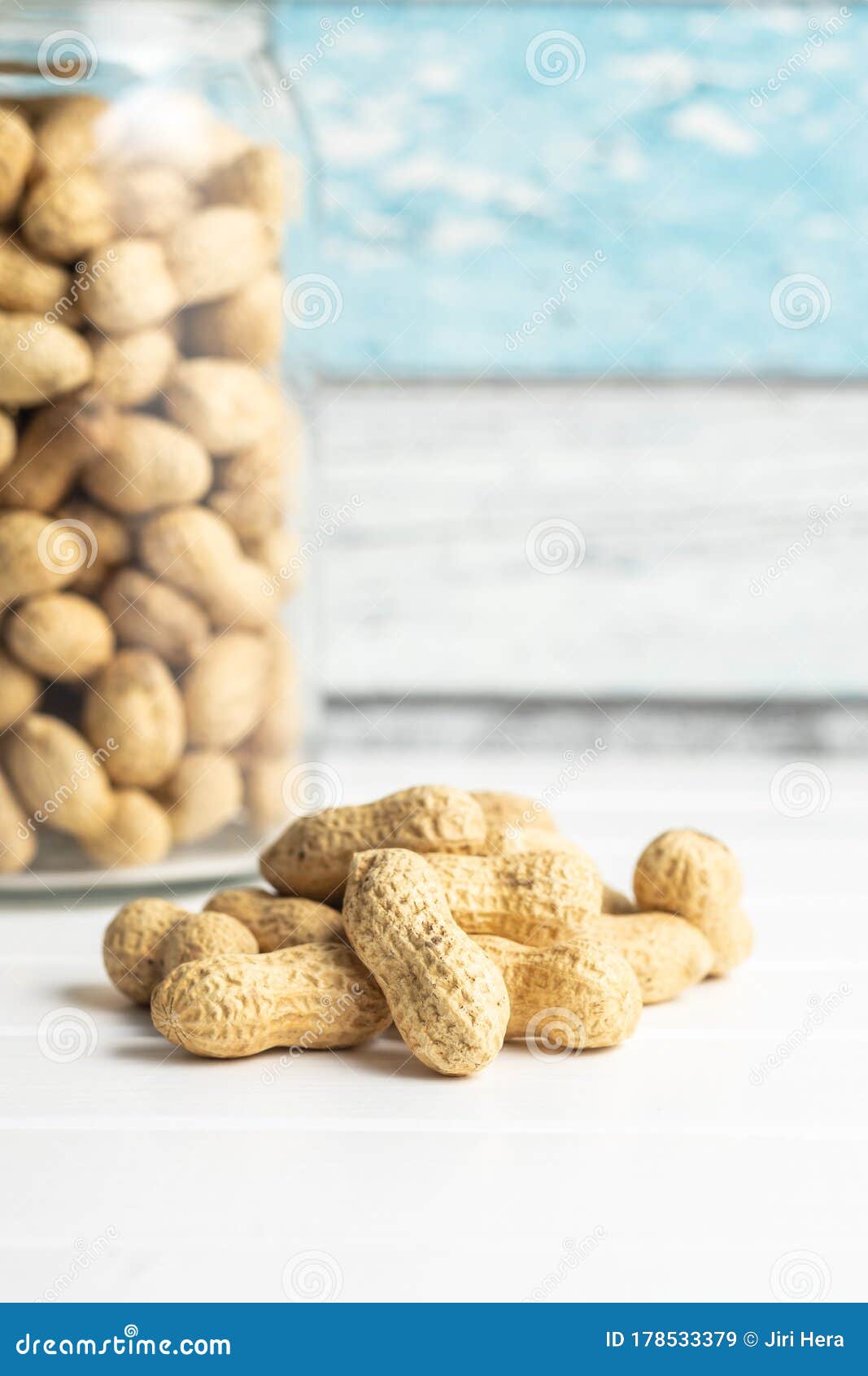 Tasty unpeeled peanuts stock image. Image of roasted - 178533379