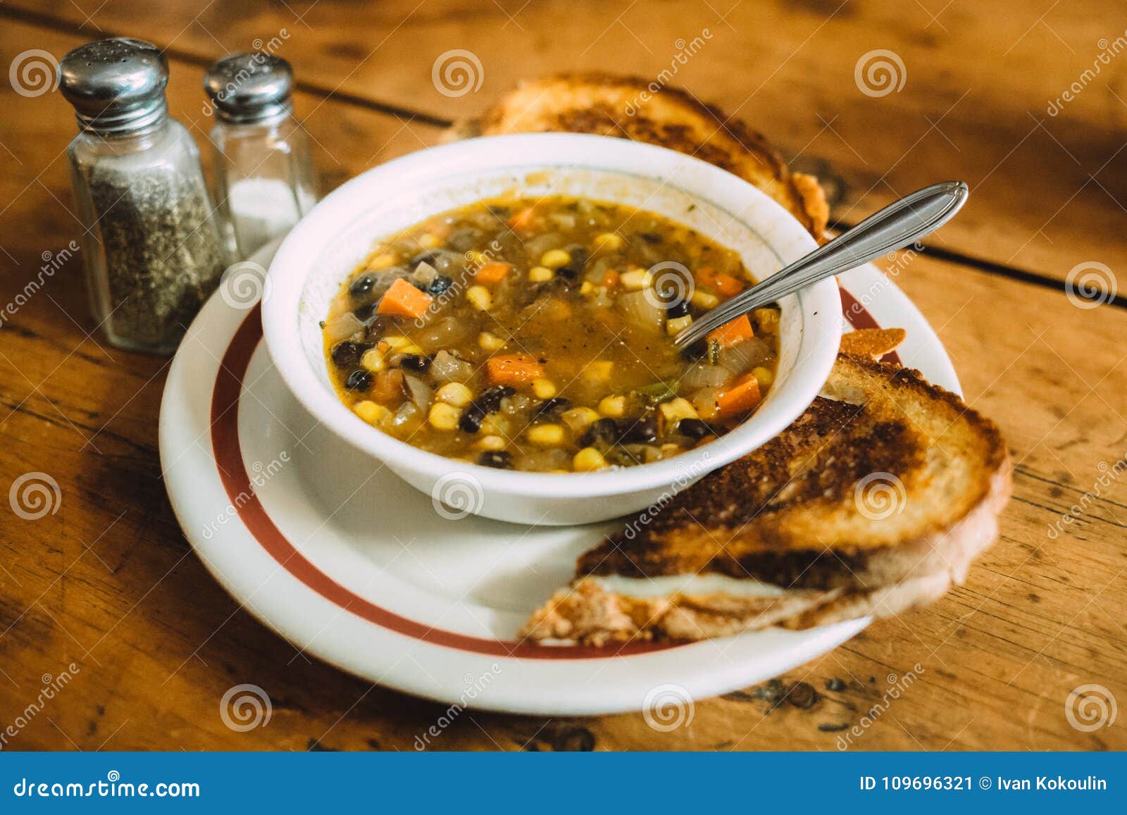 Tasty Vegetable Soup with Toasts on the Table. Stock Image - Image of ...