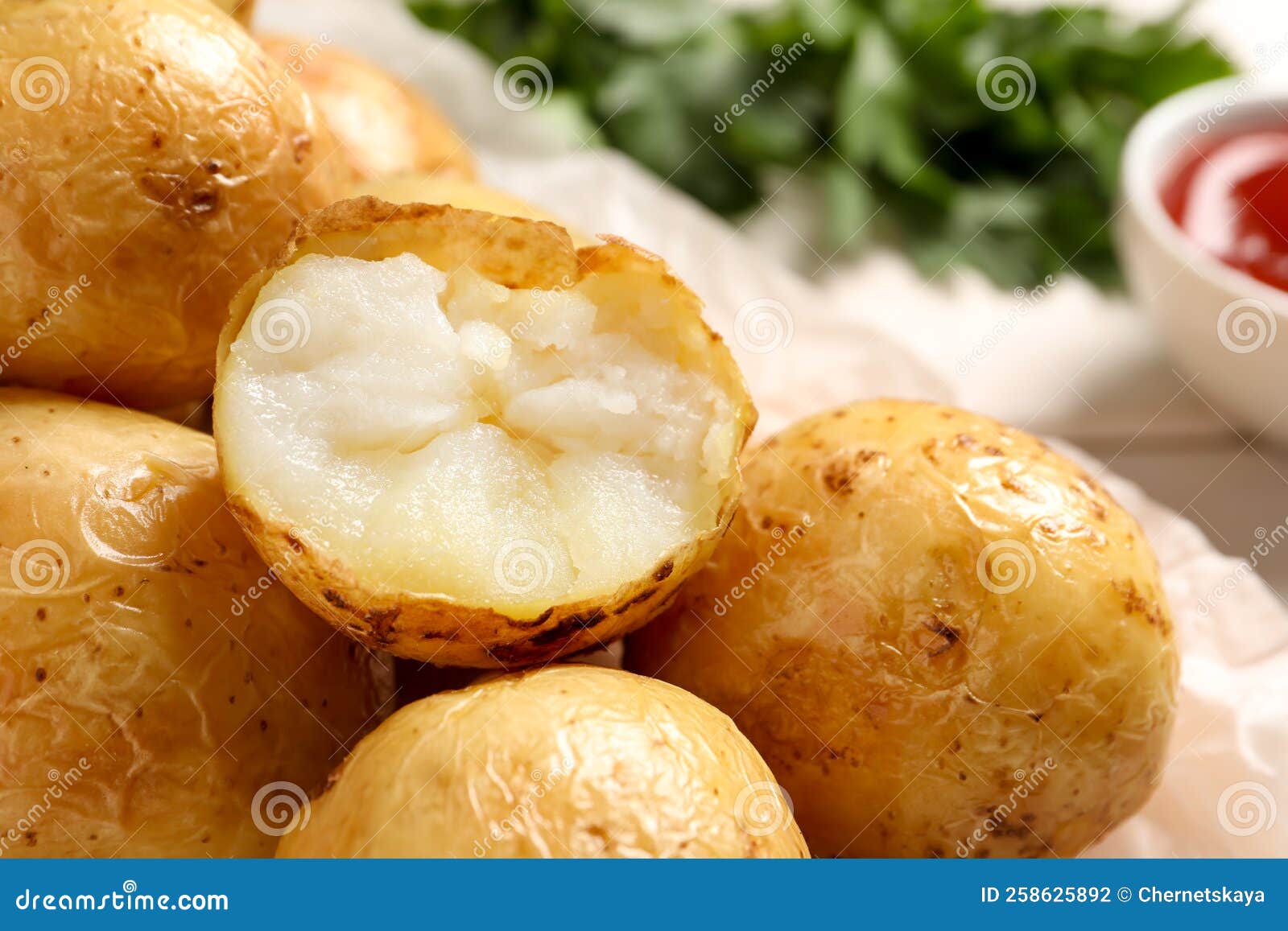 Tasty Whole Baked Potatoes on Table, Closeup Stock Photo - Image of ...