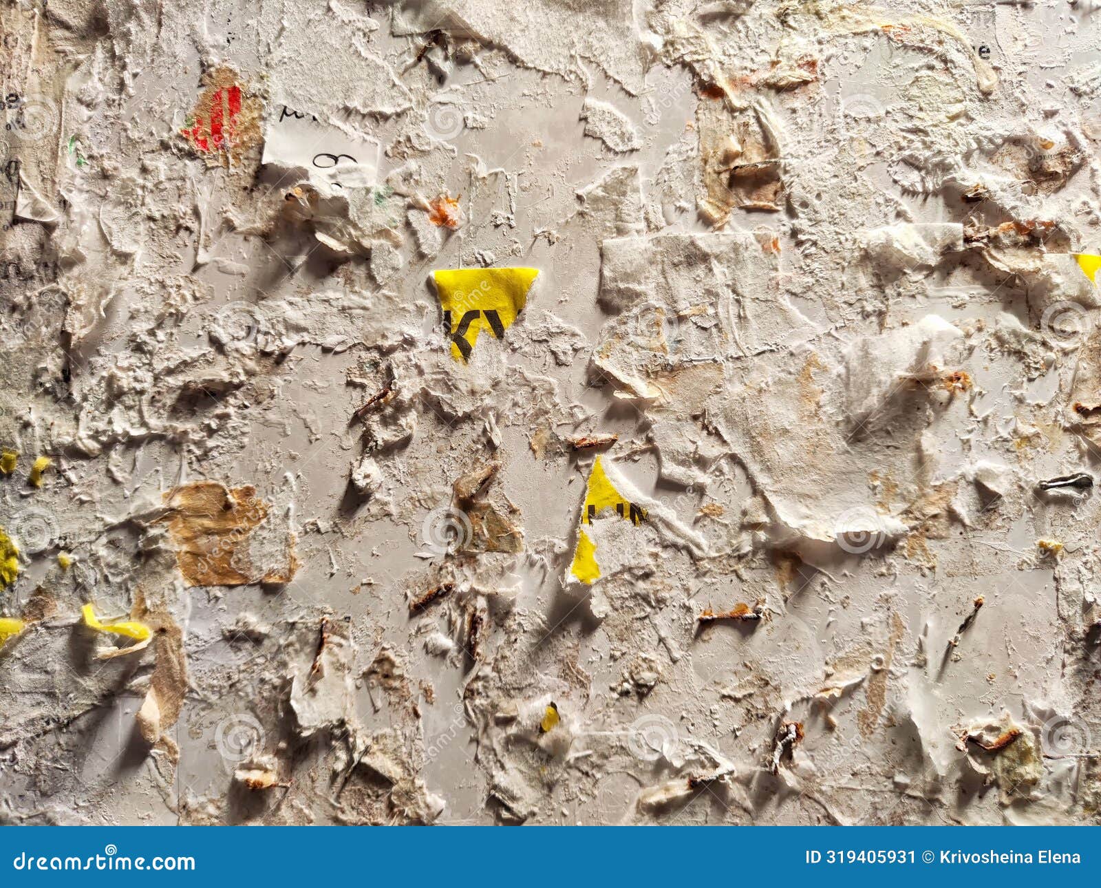Tattered Posters on a Weathered Urban Wall. Layers of Torn Posters ...