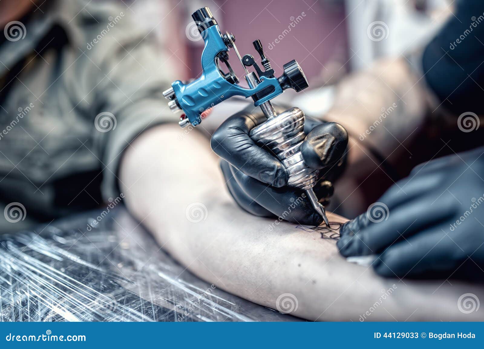 Tattoo Artist Drawing on Client with Special Tools Stock Image - Image ...