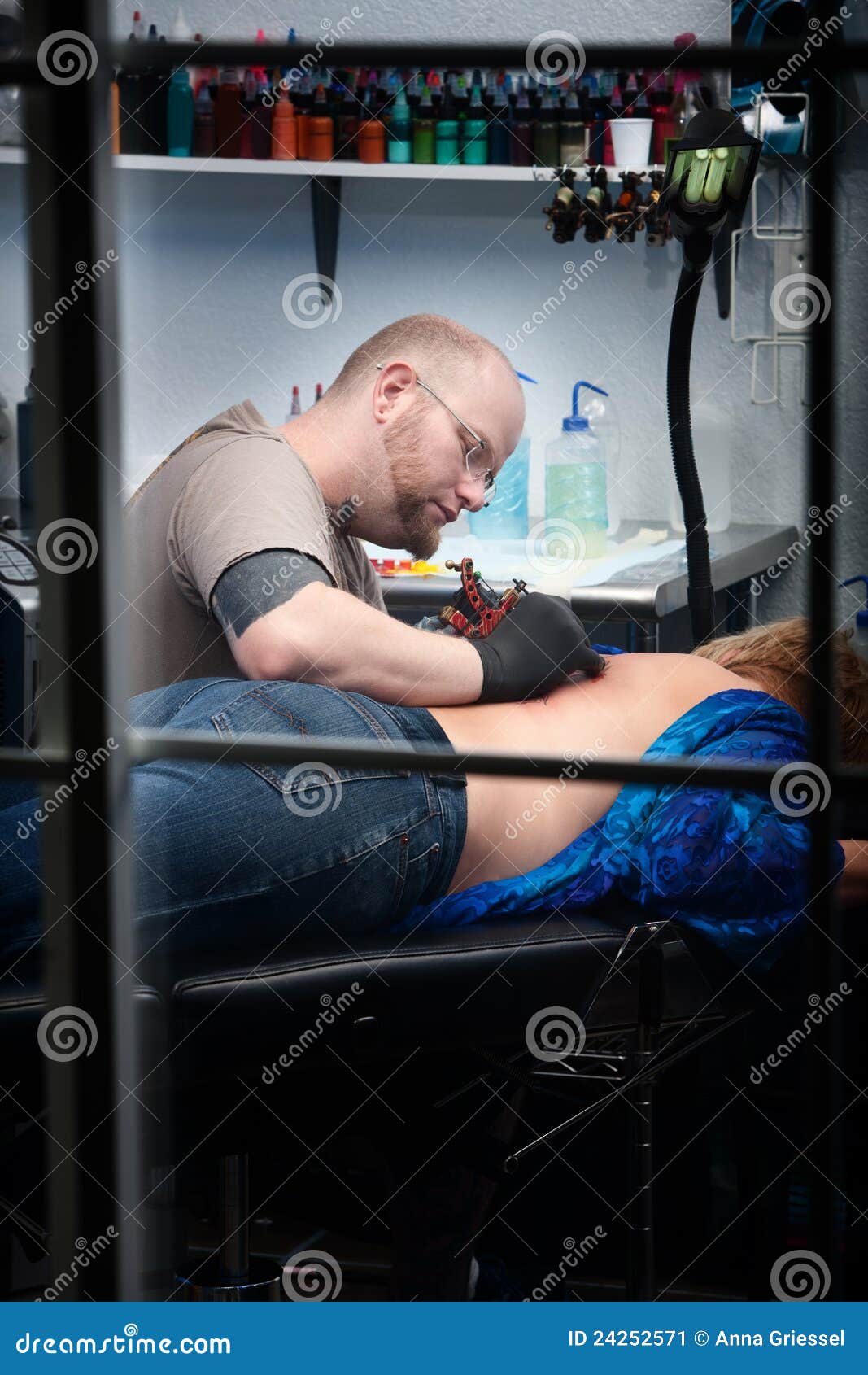 Tattoo Artist at Work stock image. Image of caucasian - 24252571