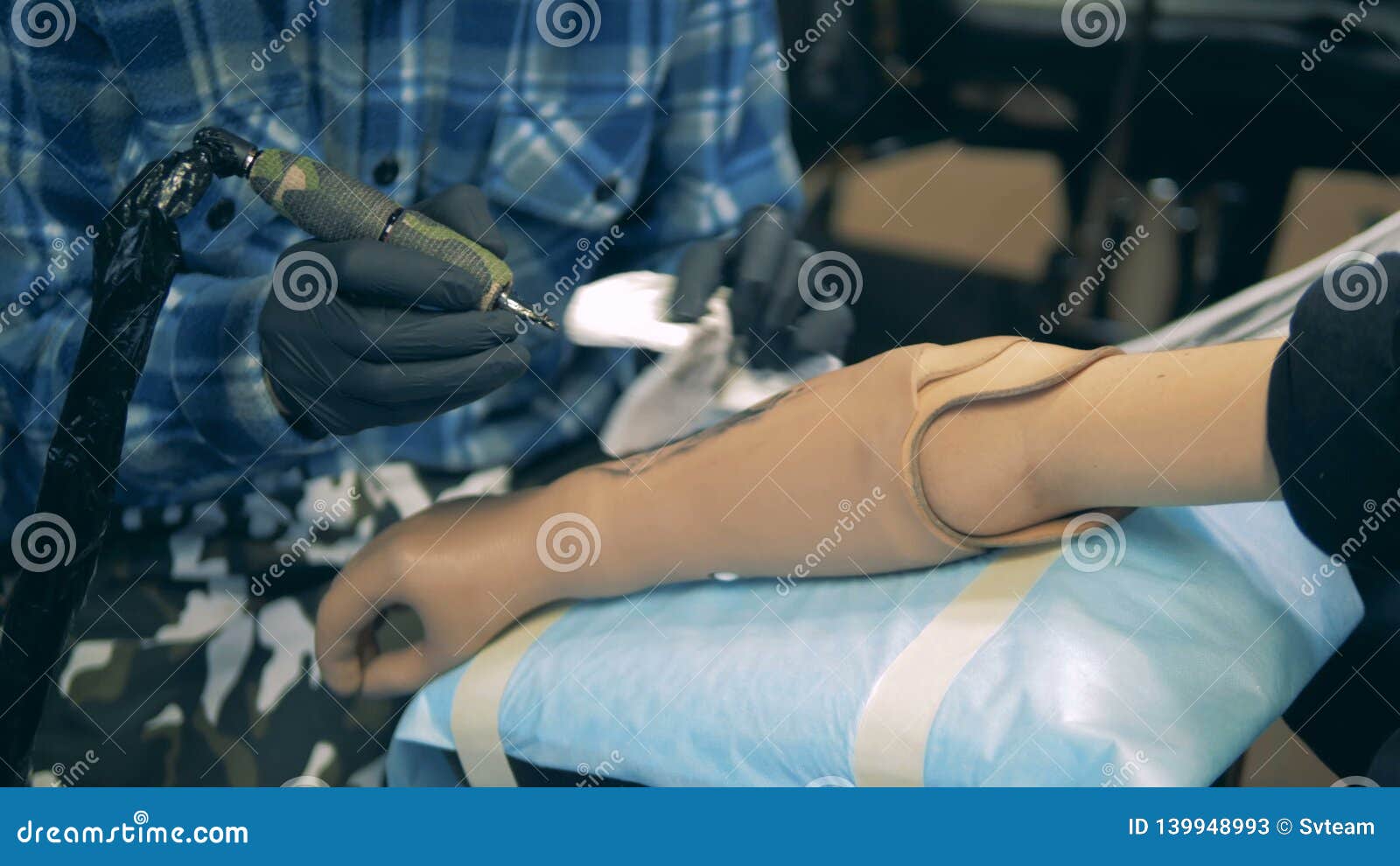 Tattoo is Being Made on a Prosthetic Arm Stock Video - Video of hand ...