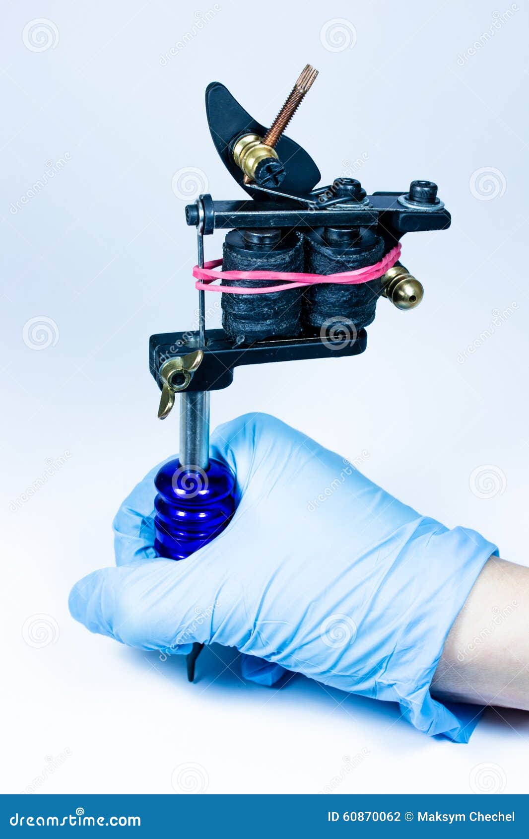Tattoo machine in hand stock photo. Image of skull, adult - 60870062