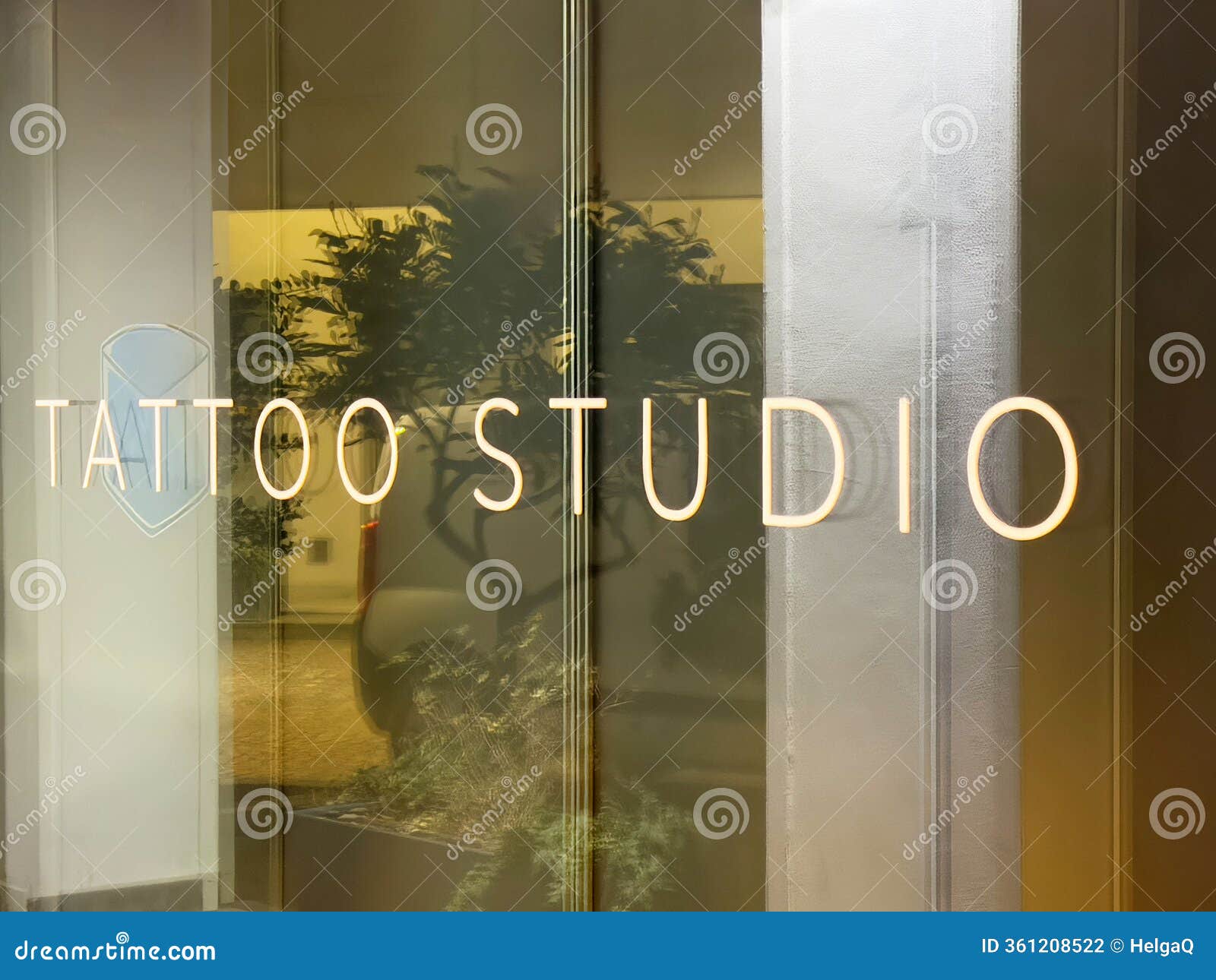 A Tattoo Sign In The Storefront Window Of Inkcrafta Tattoo Co On 7223 ...