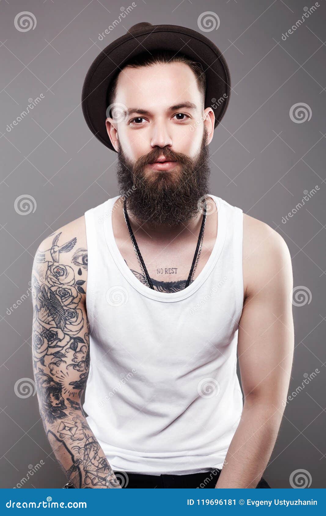 Handsome Bearded Man in Hat, with Tattoo Stock Image - Image of ... Handsome Bearded Man in Hat, with Tattoo Stock Image - Image of ...
