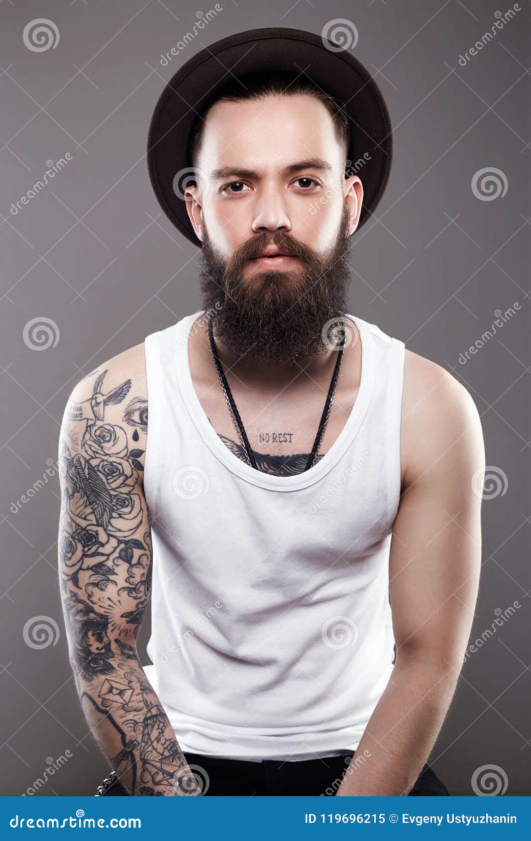 Tattooed Handsome Bearded Man in Hat Stock Image - Image of attractive ... Tattooed Handsome Bearded Man in Hat Stock Image - Image of attractive ...