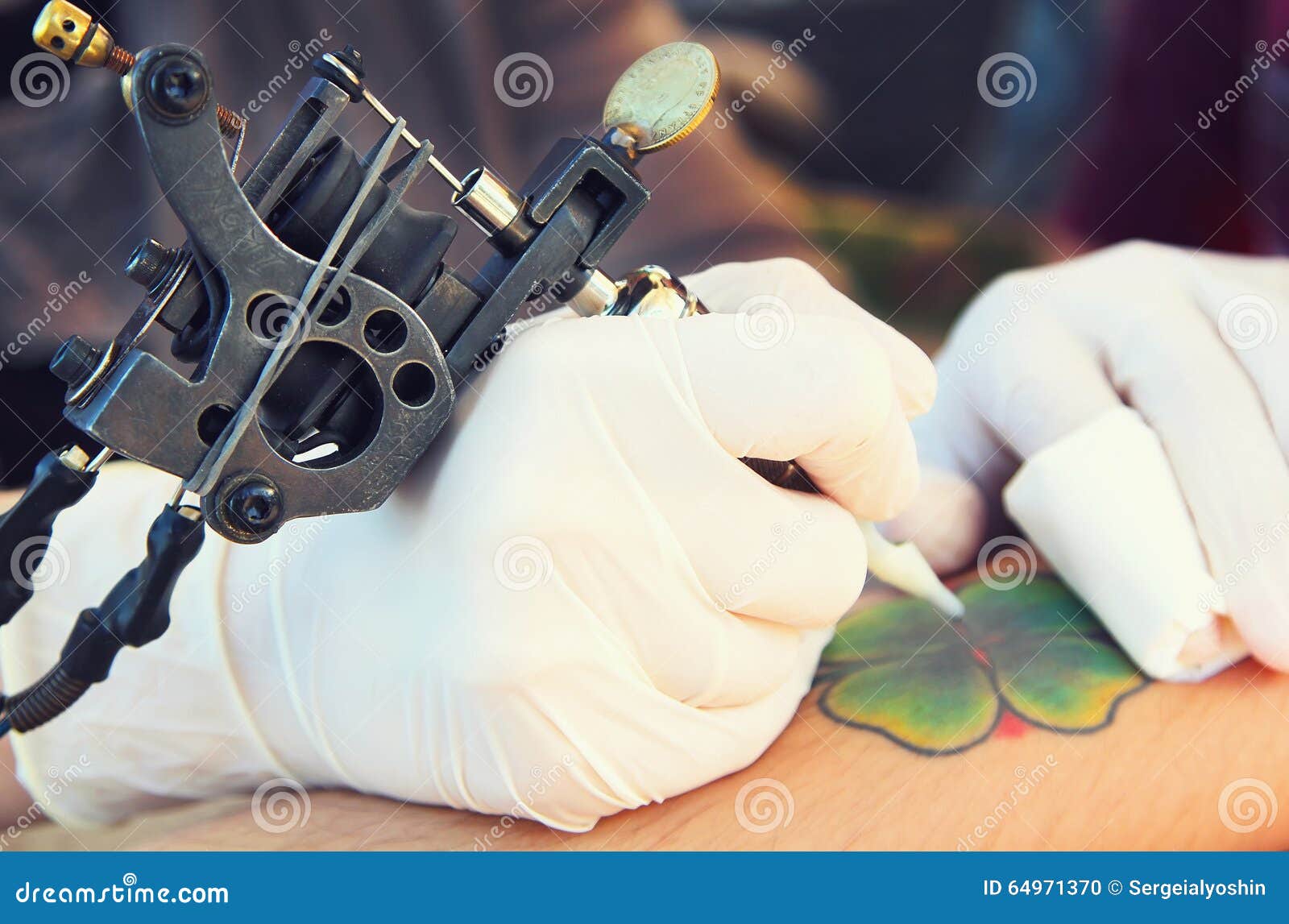 Tattooer Showing Process of Making a Tattoo Stock Photo - Image of ...