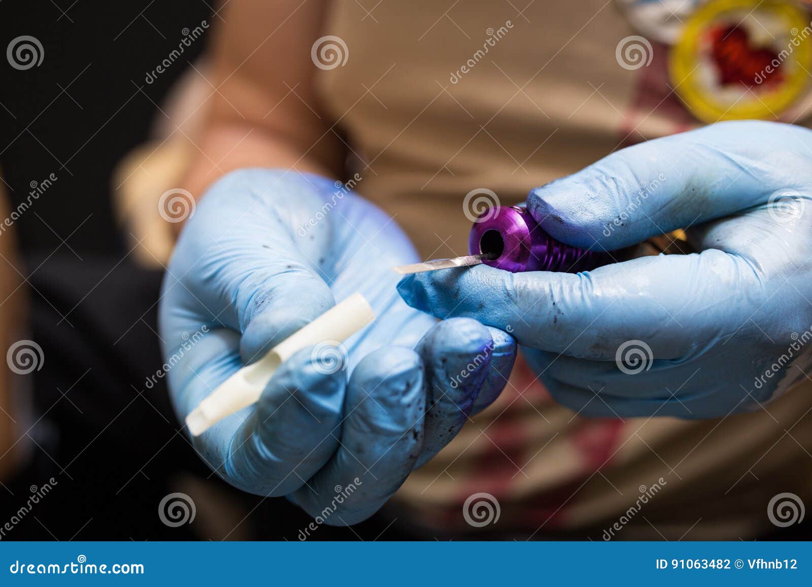 Tattooer Showing Process of Making a Tattoo, Hands Holding a Tatoo ...