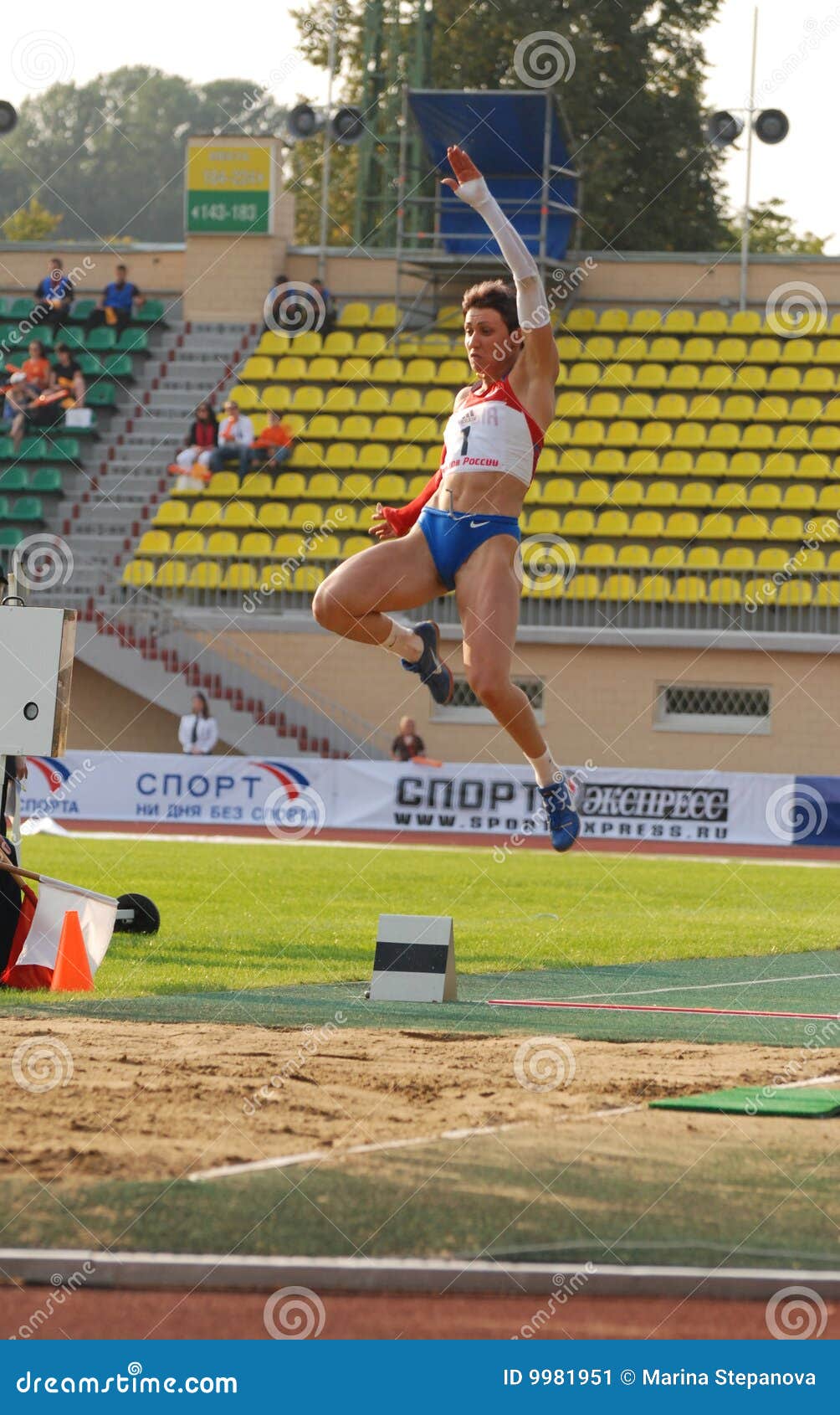 Long Jump Athlete Editorial Photo | CartoonDealer.com #33616289