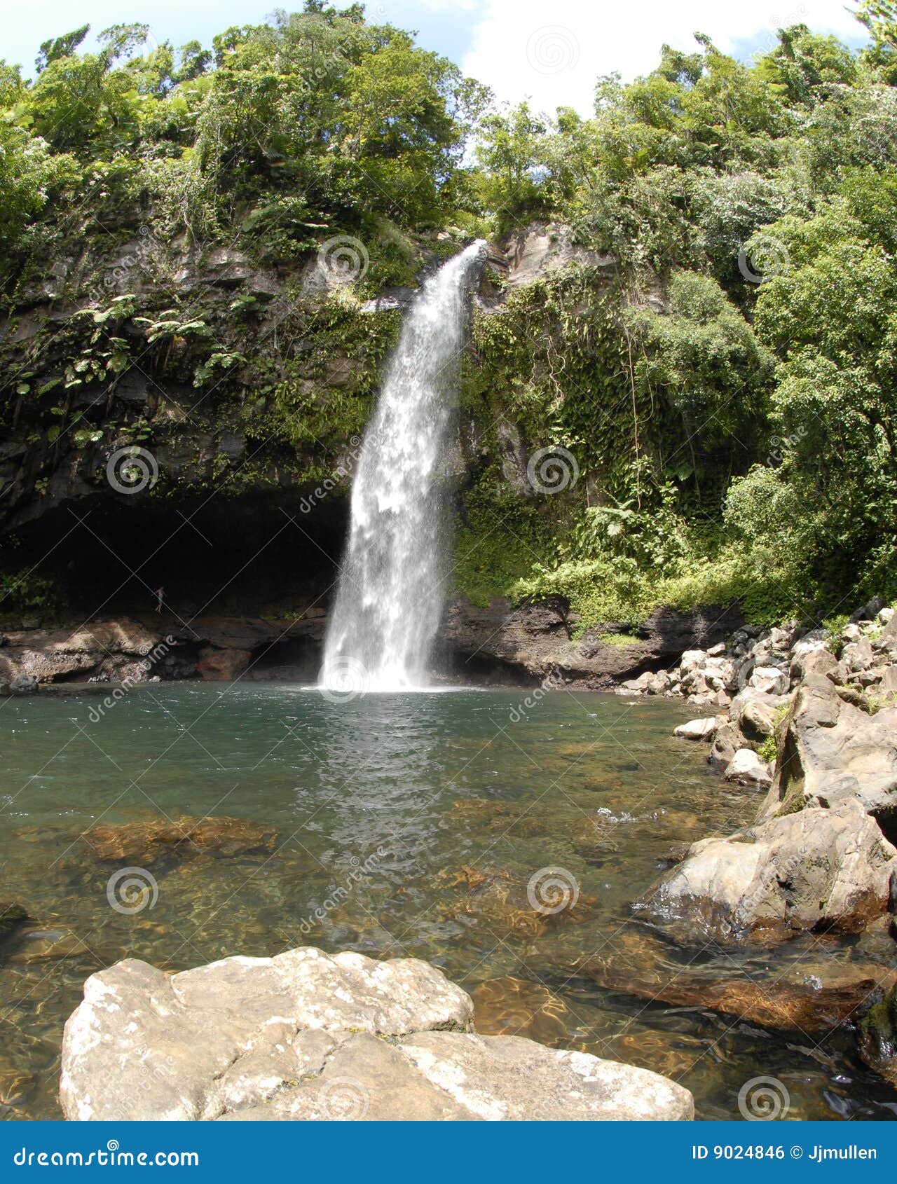 Tavoro waterfall stock photo. Image of tropical, hole - 9024846