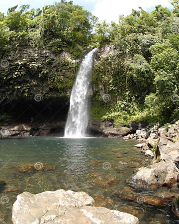 Tavoro waterfall stock photo. Image of tropical, hole - 9024846