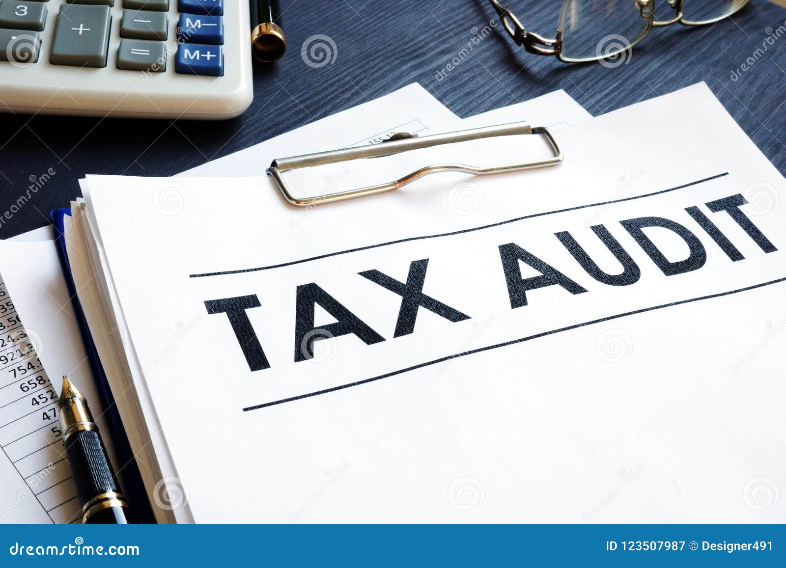 Tax Audit Documents and Calculator on a Table. Stock Image - Image of ...