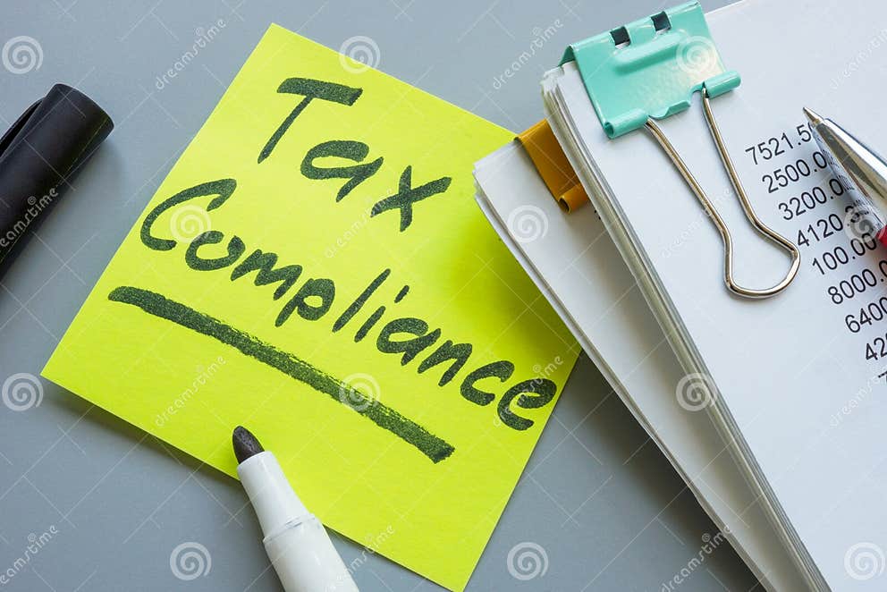 Tax Compliance. Stack of Accounting Documents and Sticky Note. Stock ...