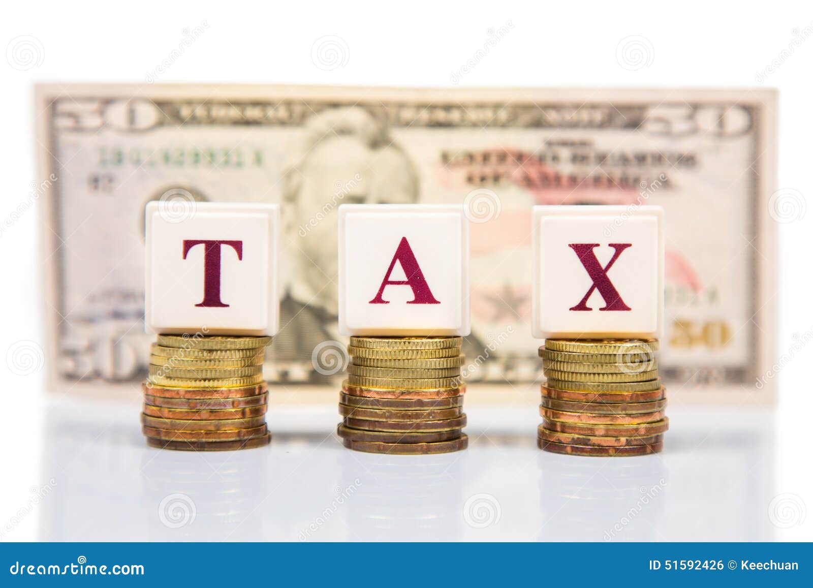 TAX Concept with Stack of Coin and US Dollar Currency As Backdrop Stock ...