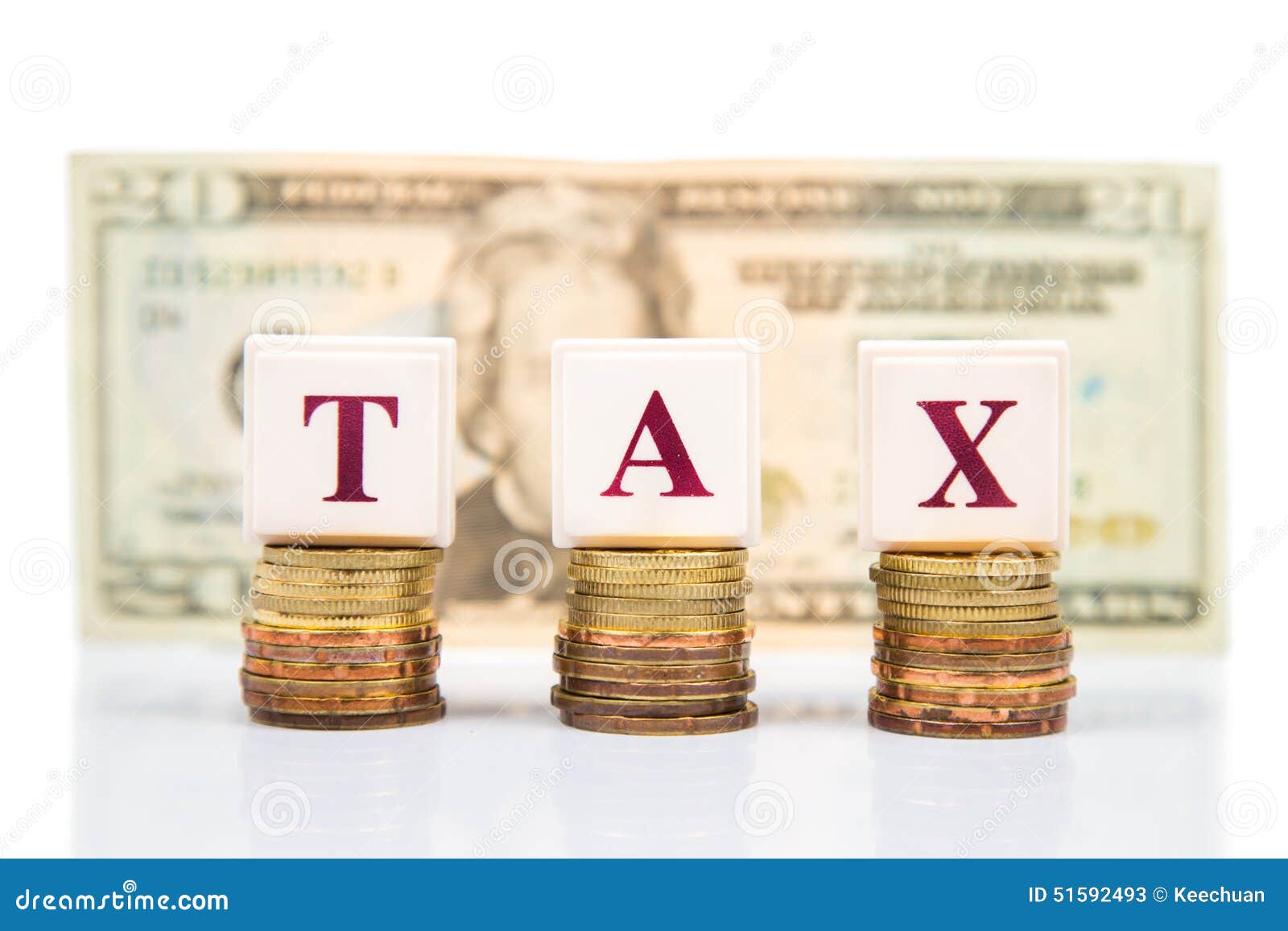 TAX Concept with Stack of Coin and US Dollar Currency As Backdrop Stock ...