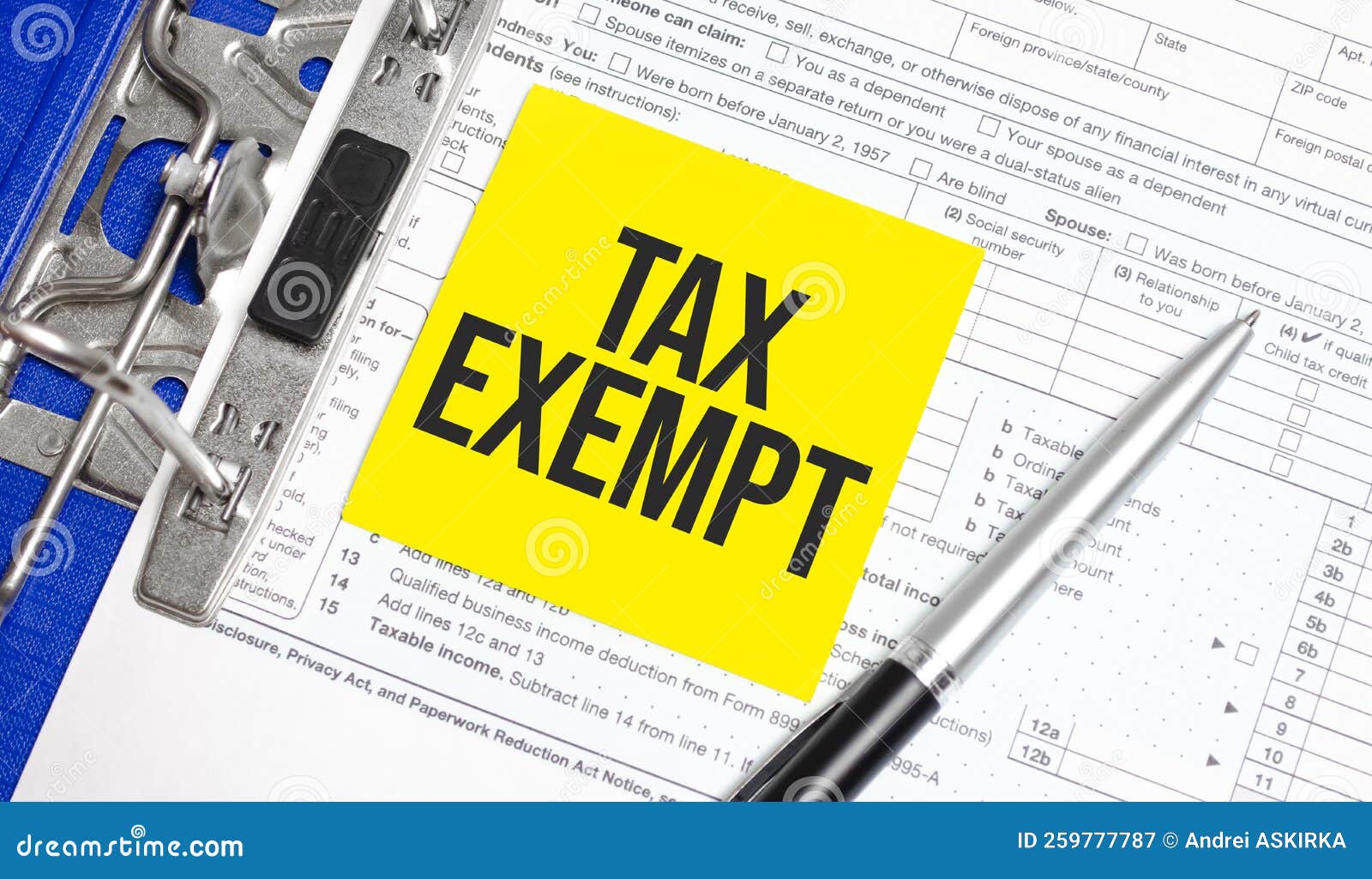 Tax Exempt Words with Tax Forms on Blue File Folder Stock Image - Image ...
