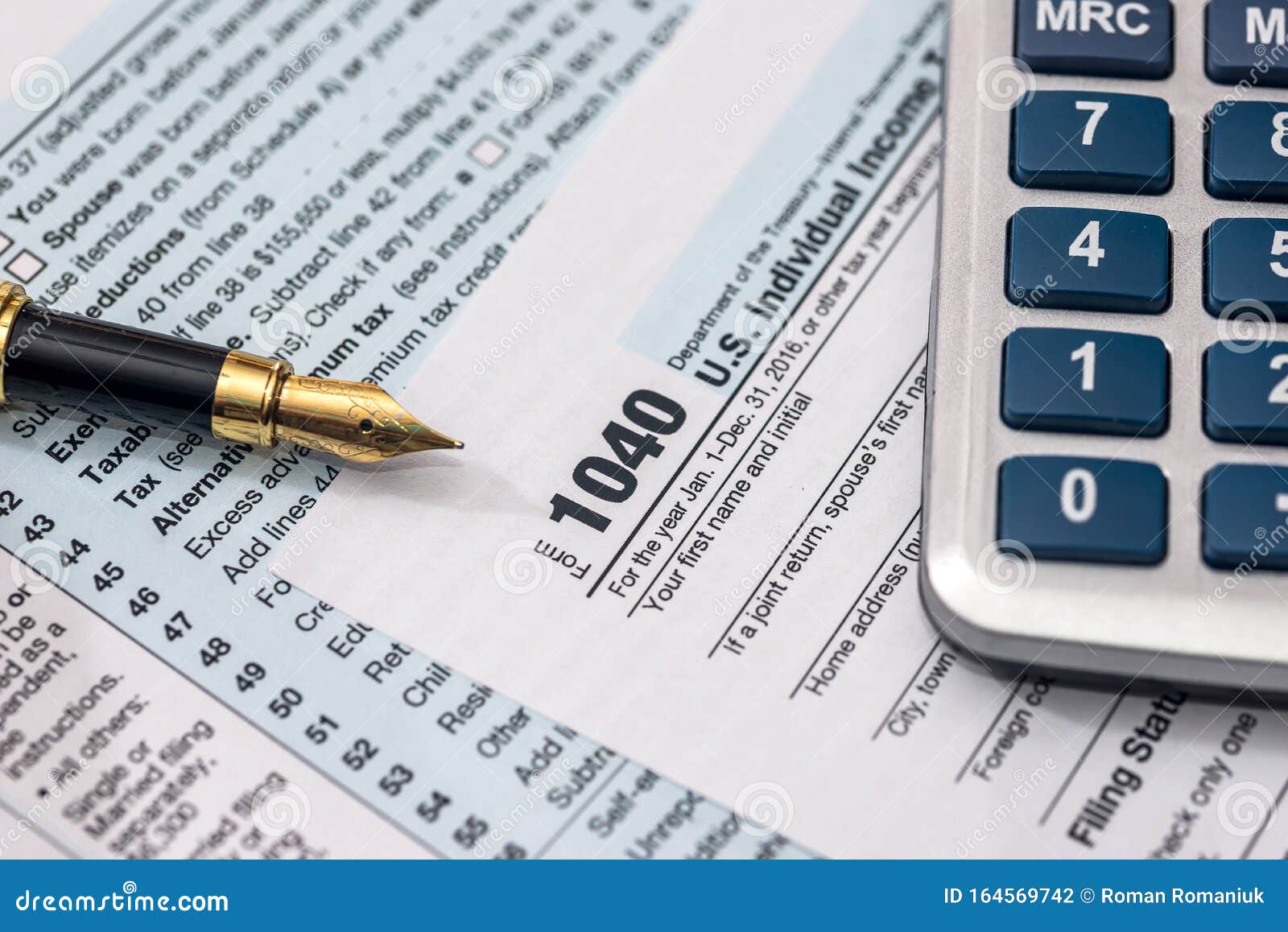 1040 Tax Form with Calculator and Pen Editorial Photography - Image of ...