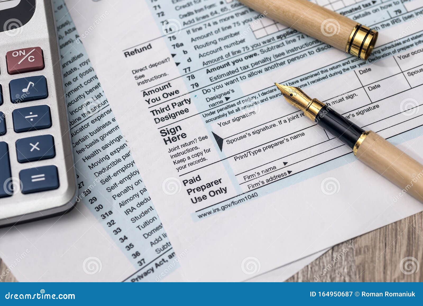 1040 Tax Form with Calculator and Pen Editorial Photography - Image of ...