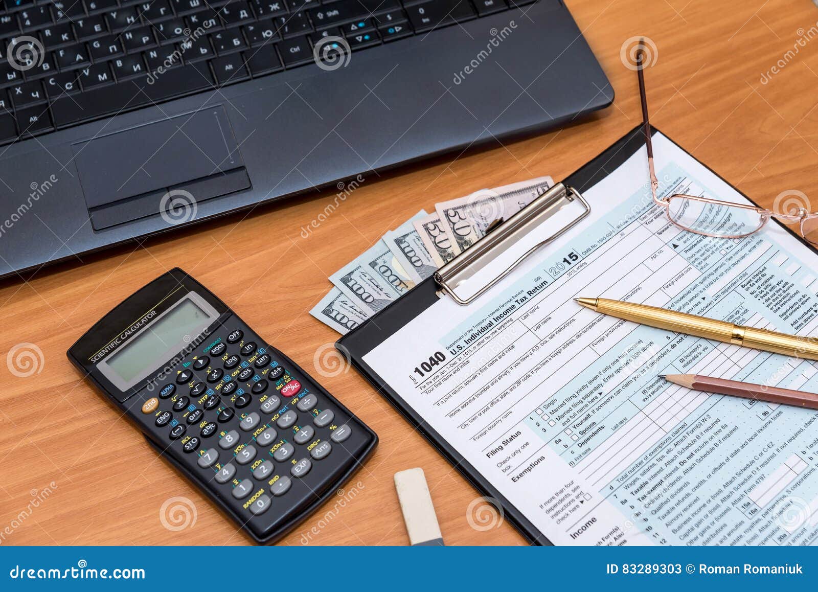 Tax form with computer editorial stock photo. Image of desk - 83289303