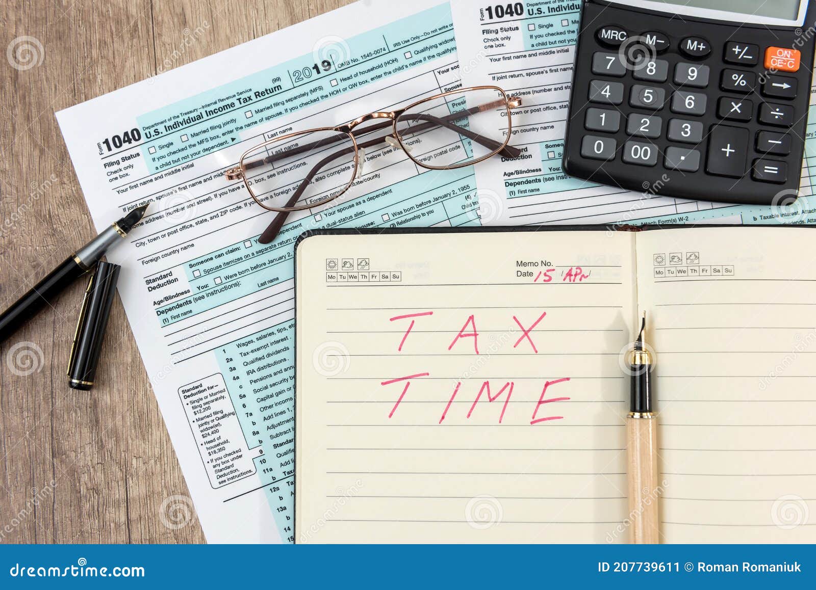 Tax Form 1040 with Notepad and Text Tax Time, Pen and Calculator. Tax ...