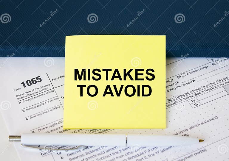 Tax Form 1065 with Yellow Sticker with Text Mistakes To Avoid. Notepad ... Tax Form 1065 with Yellow Sticker with Text Mistakes To Avoid. Notepad ...