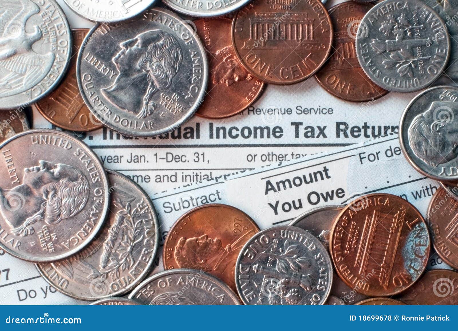 Tax forms with coins stock photo. Image of pennies, return - 18699678