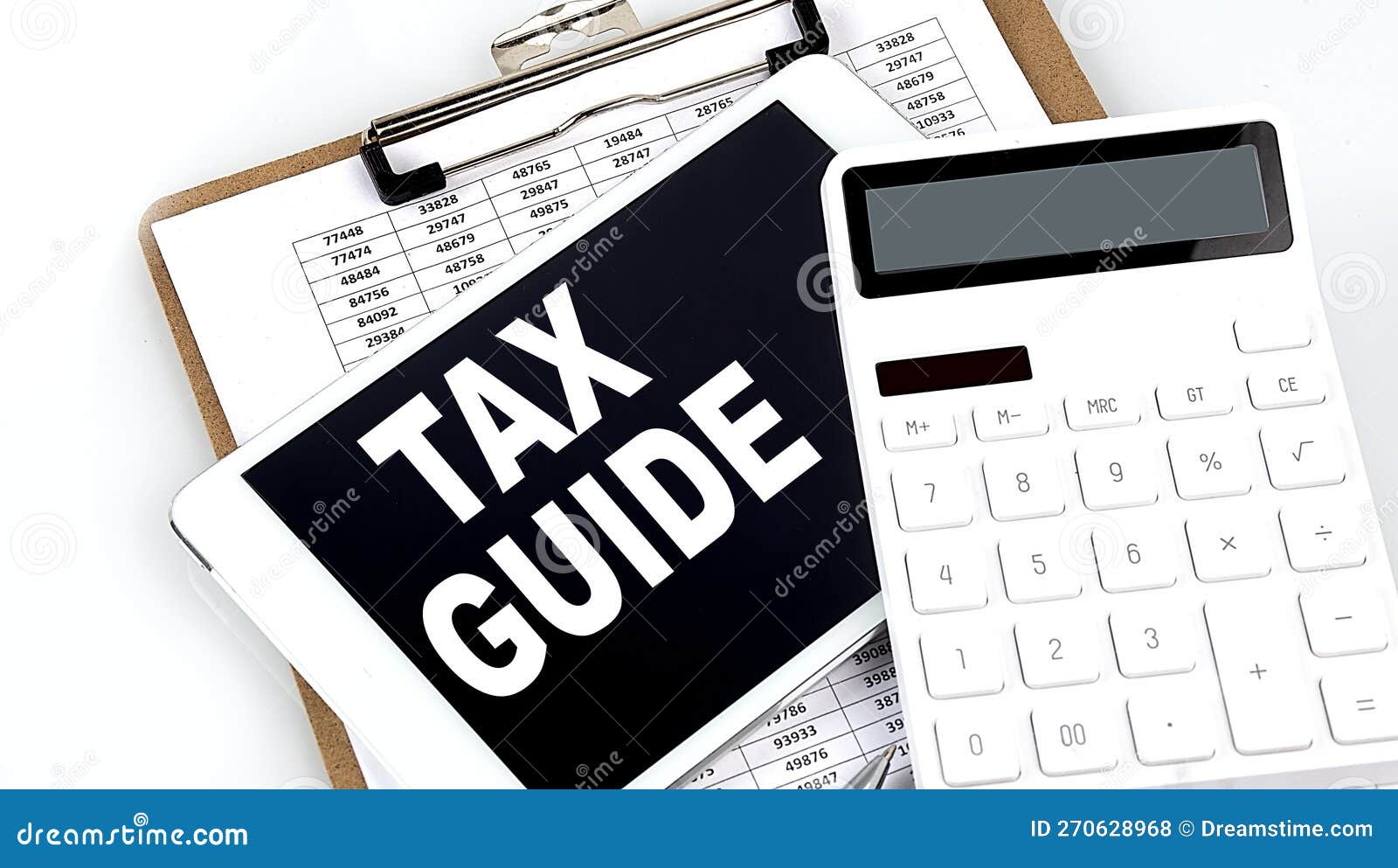 TAX GUIDE Text on a Tablet with Chart, Calculator and Pen Stock Photo ...