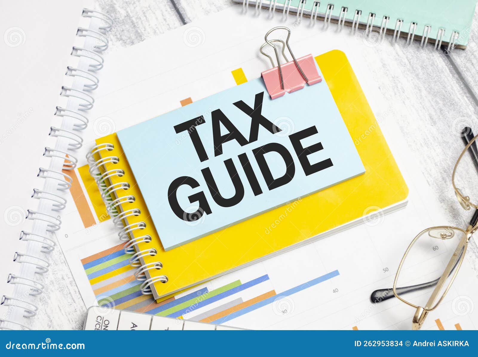 TAX GUIDE Words on Blue Sticker with Glasses Stock Photo - Image of ... TAX GUIDE Words on Blue Sticker with Glasses Stock Photo - Image of ...
