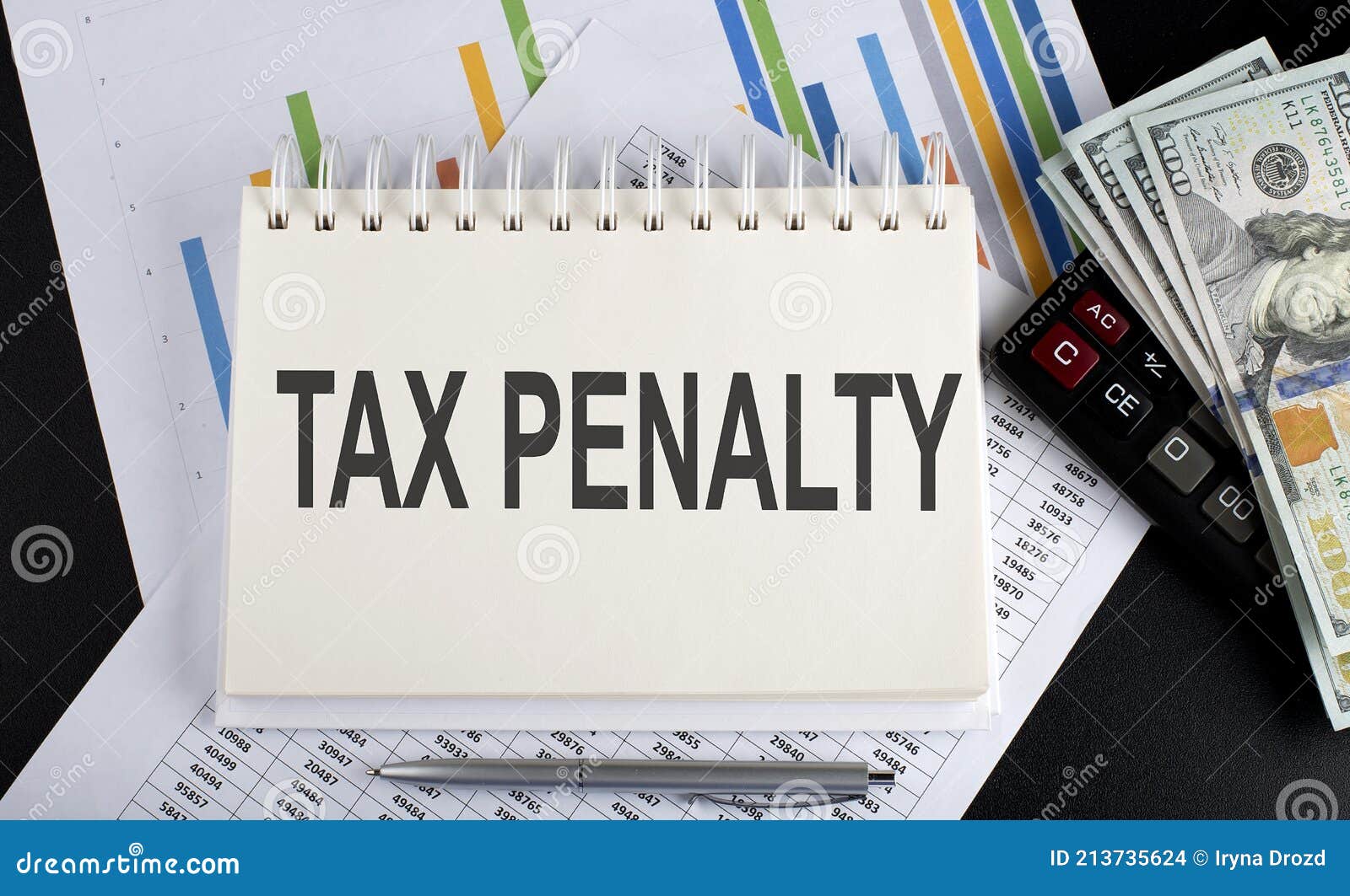 TAX PENALTY Text Written on the Notebook with Chart,calculator and ...