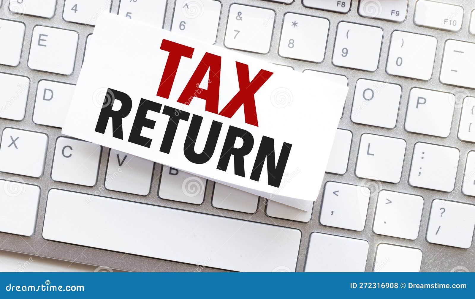Tax Return Written on Paper Sheet on a Computer Keyboard Stock Photo ...