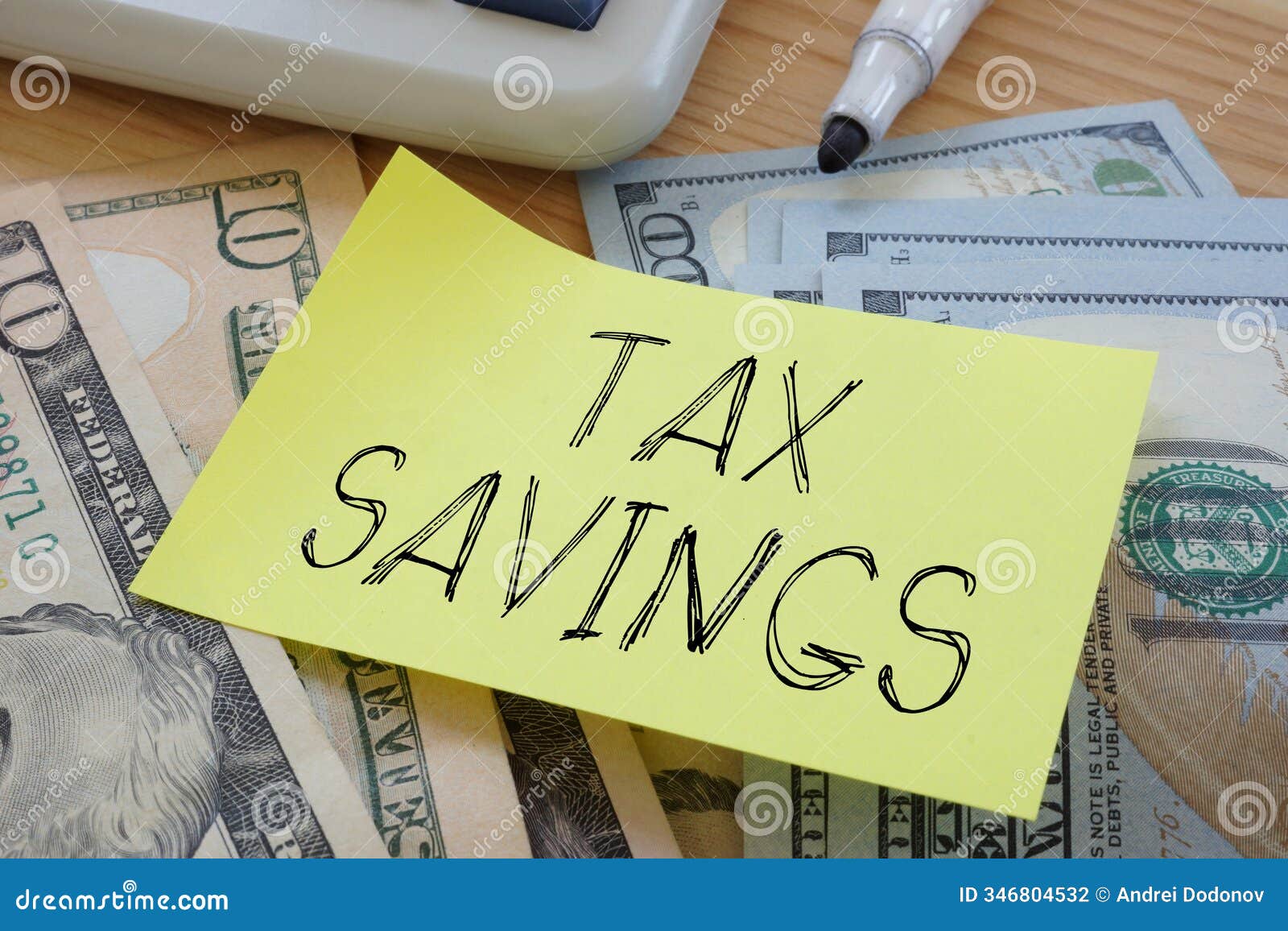 Tax Savings are Shown Using the Text As Business Concept Stock Photo ...