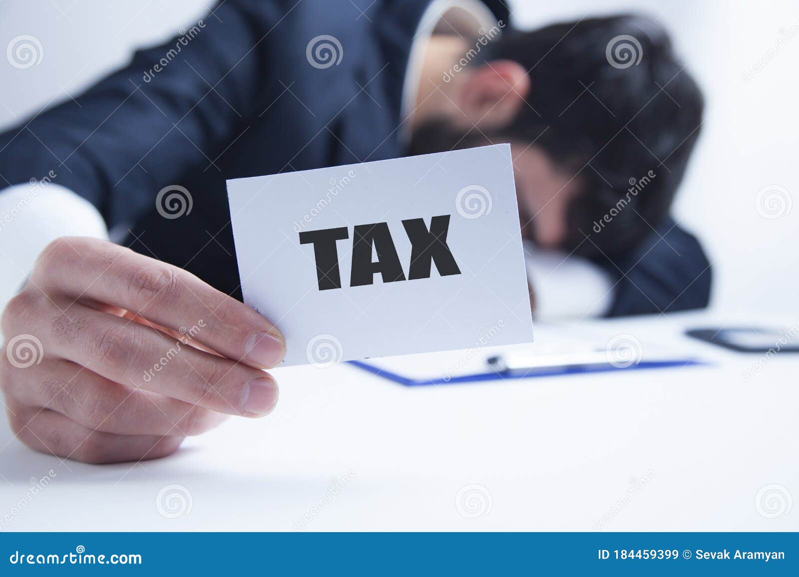 Tax text on card stock image. Image of table, concept - 184459399