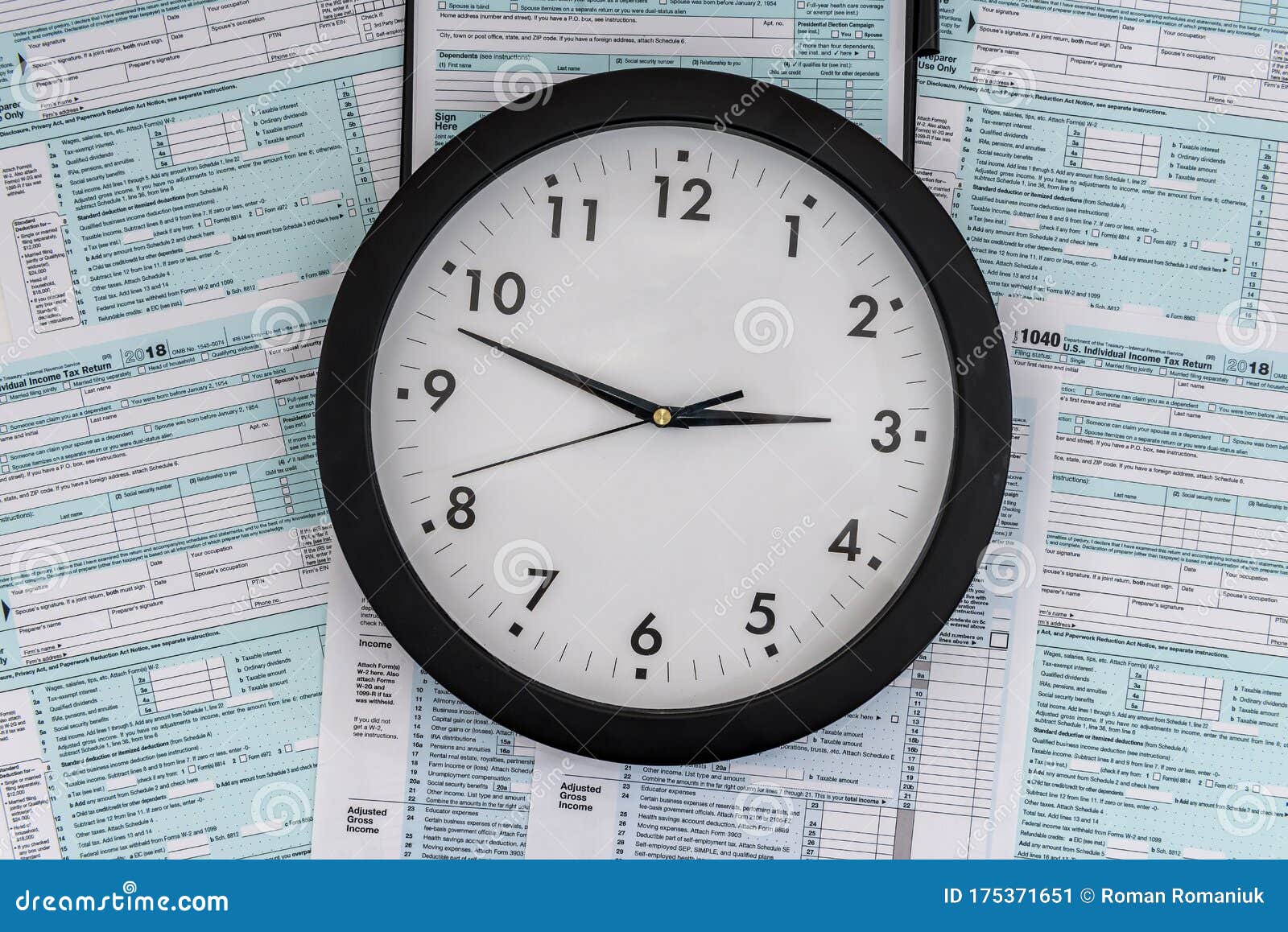 Tax Time Concept, Clock at 1040 Tax Form Editorial Photo - Image of ...