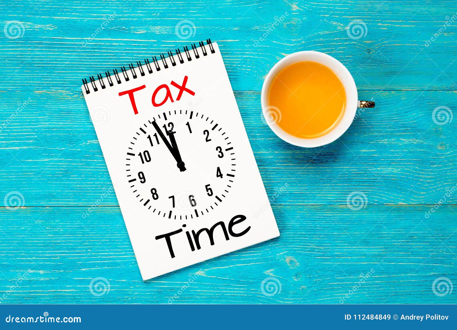 Tax Time, Message with Clock in Notepad Over Turquoise Table Stock ...