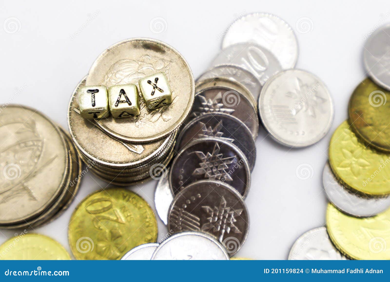 â€œTAXâ€ Wording on a Stack of Coins Stock Photo - Image of cash ...