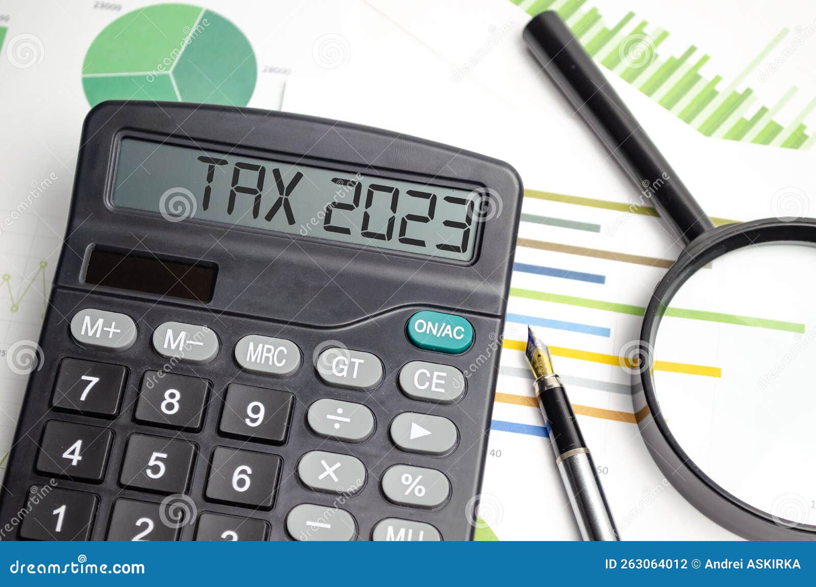 Tax 2023 Words on Calculator Display and Charts Stock Photo - Image of ...