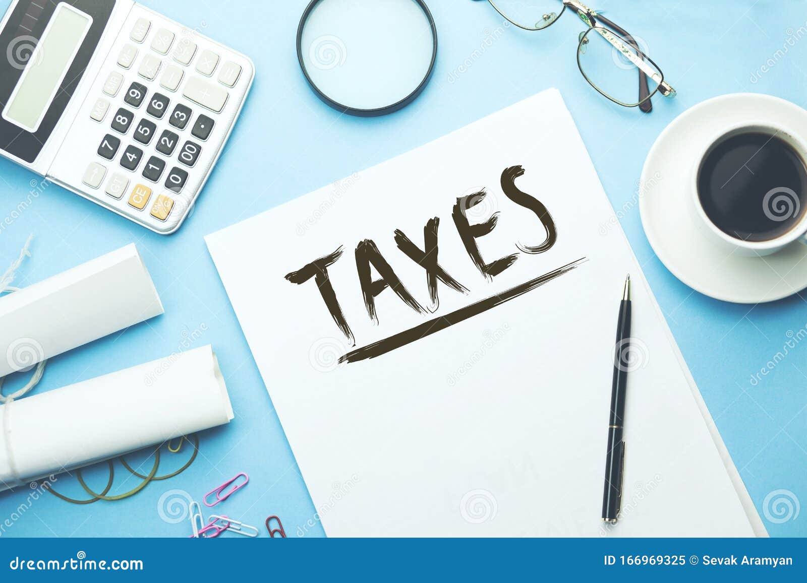Taxes text on paper stock image. Image of study, document - 166969325