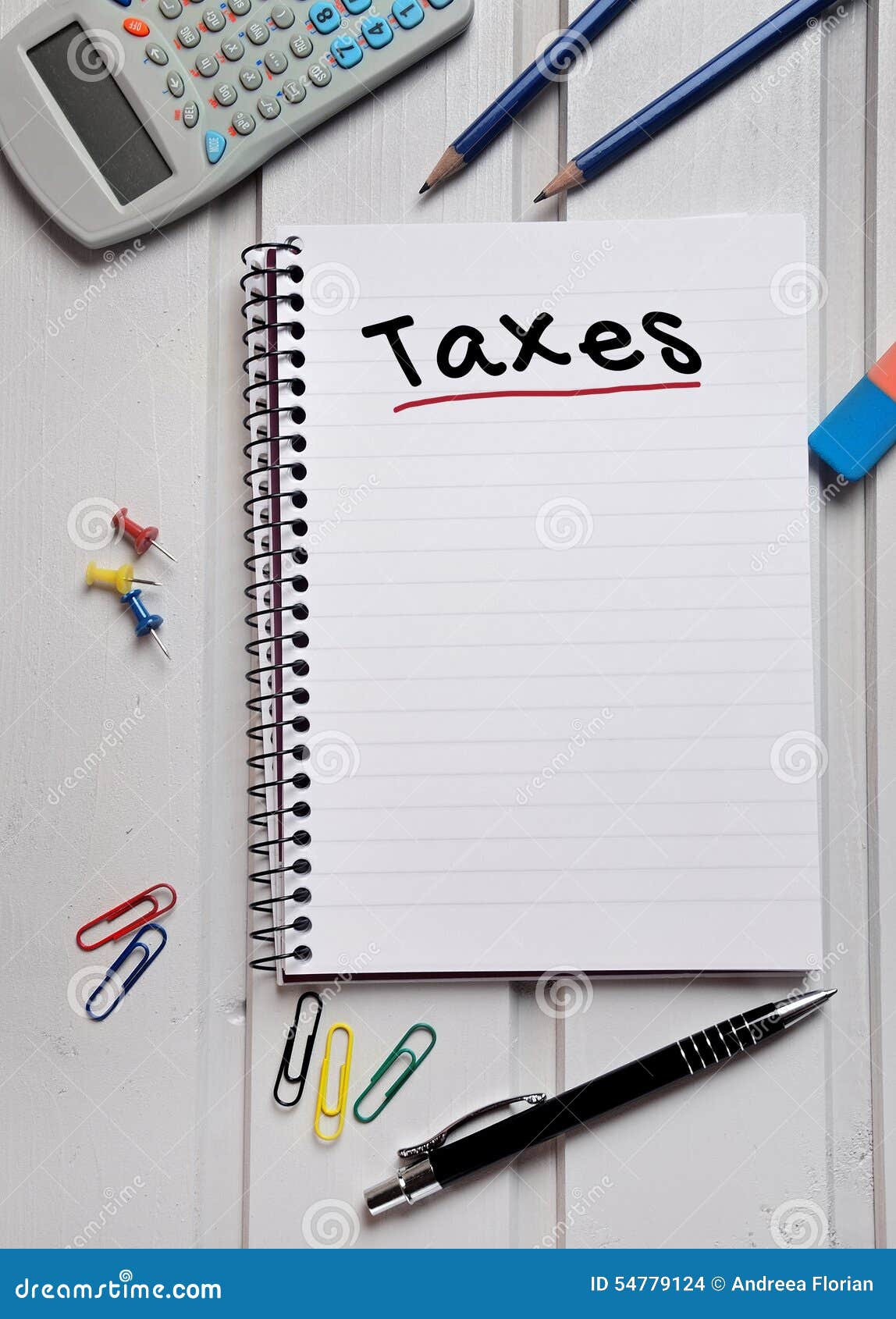 Taxes word on notebook stock photo. Image of finance - 54779124