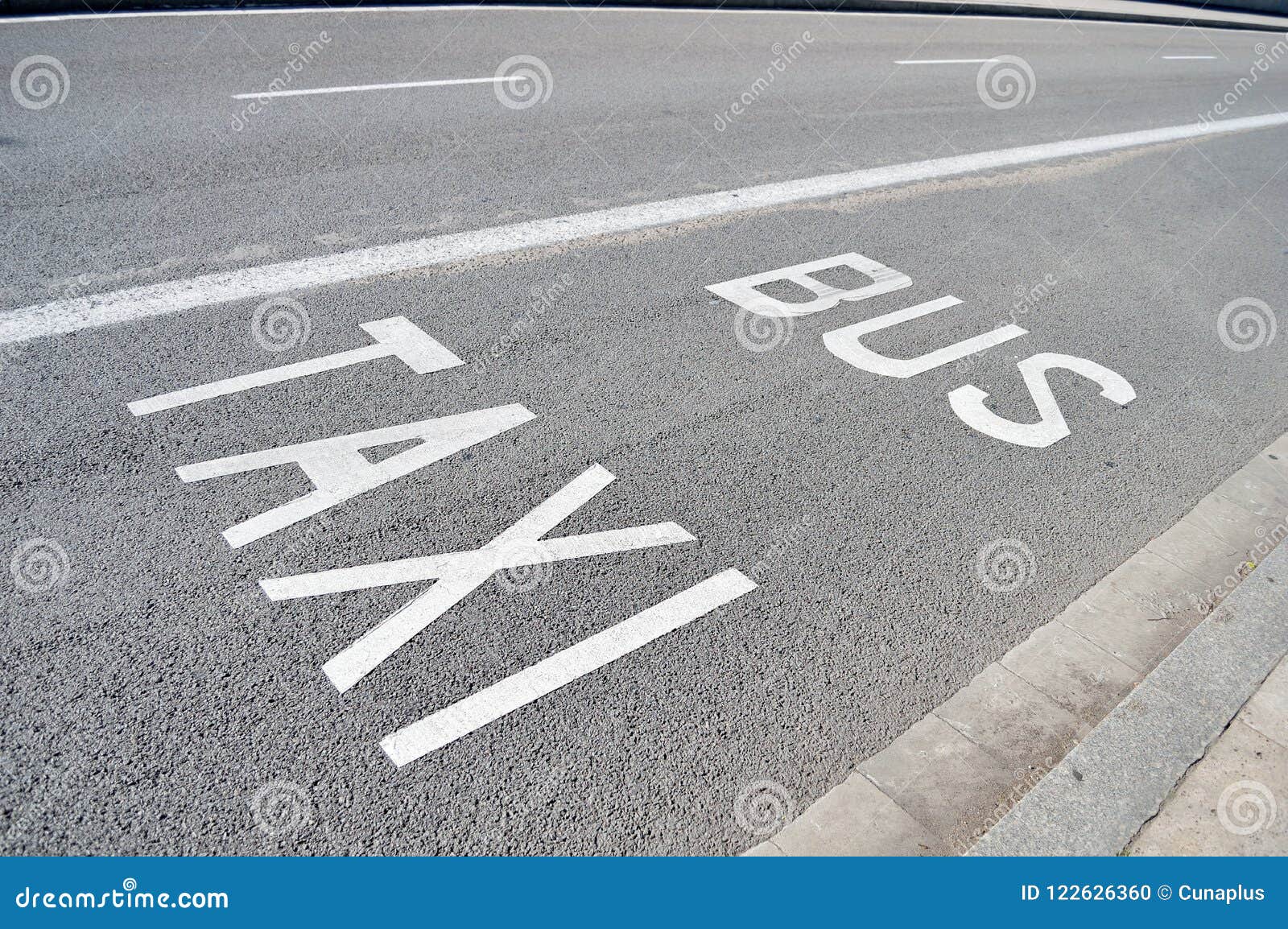 Taxi and bus lane stock photo. Image of sign, stone - 122626360