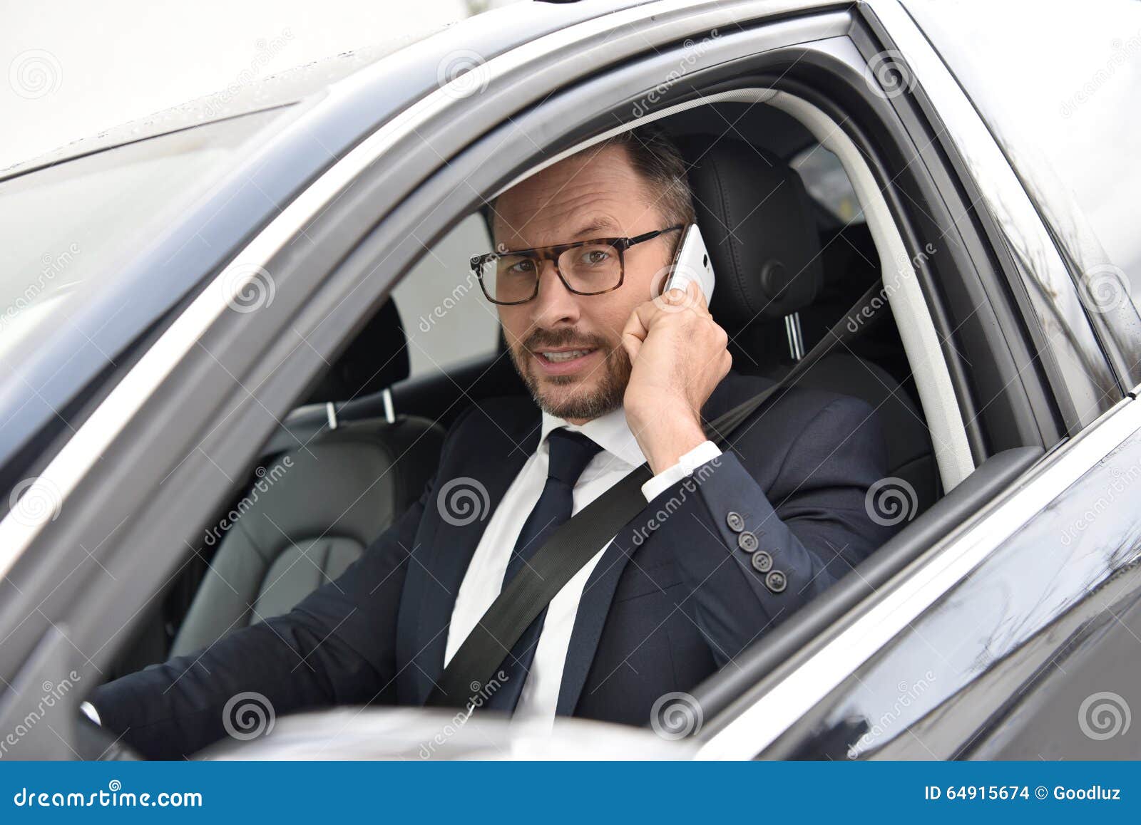 Taxi Driver Using Smartphone Stock Photo - Image of mobile, auto: 64915674