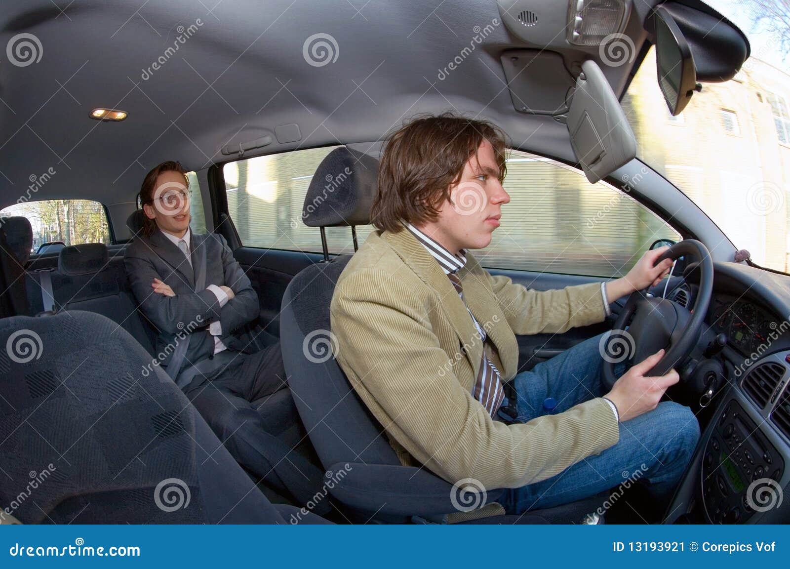Taxista y pasajero imagen de archivo. Imagen de sentada - 13193921