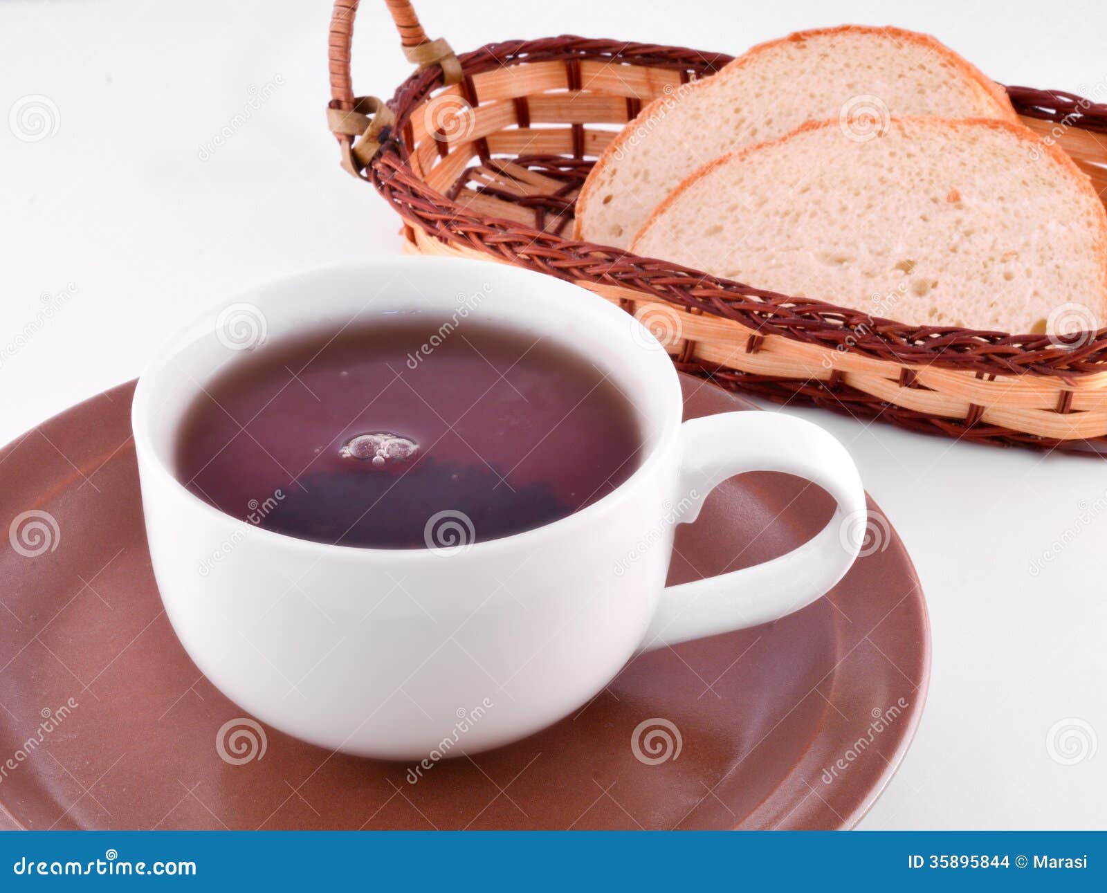 Taza de té y de pan foto de archivo. Imagen de concepto - 35895844