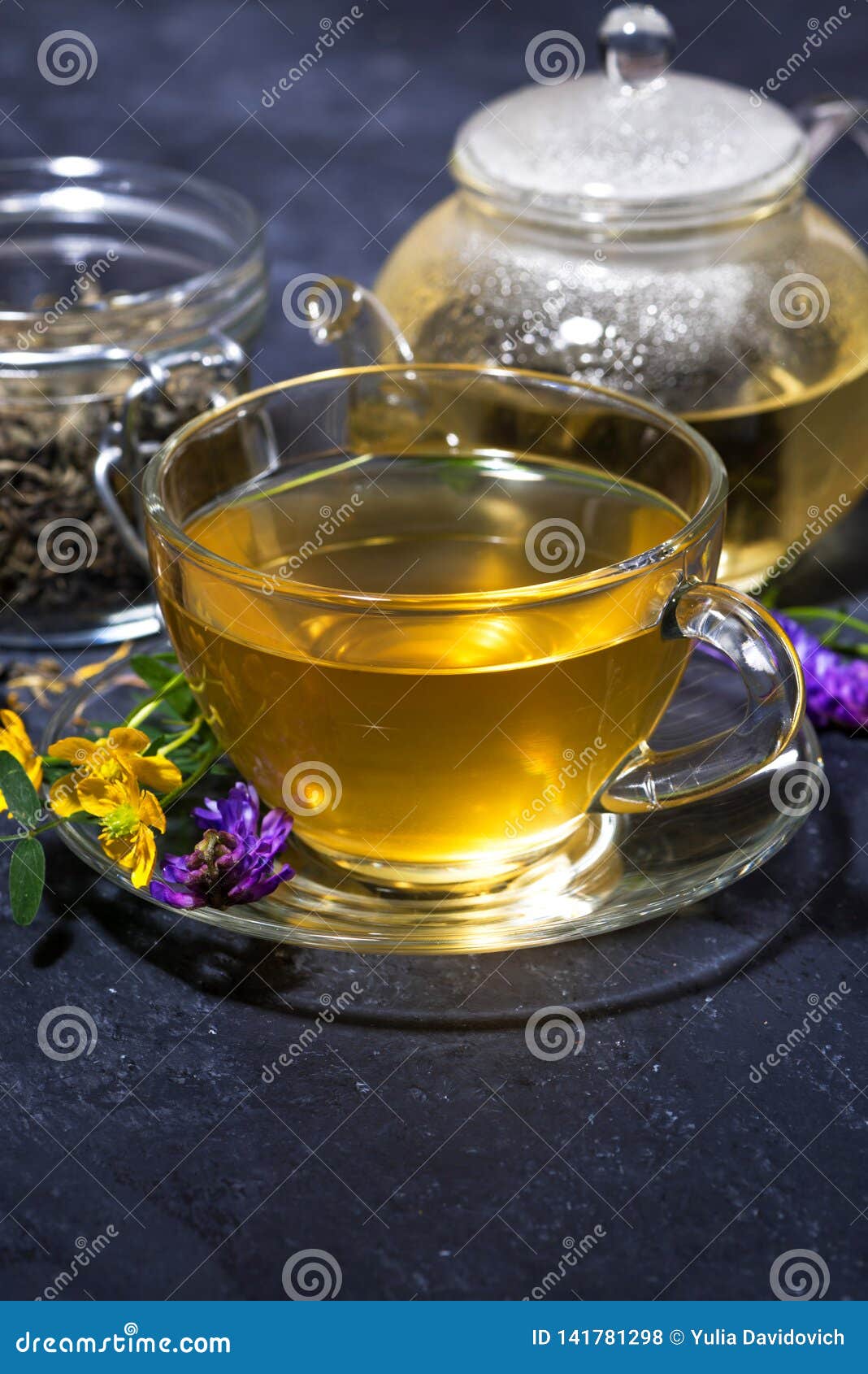 Tea with Aromatic Herbs on a Dark Table, Vertical Stock Photo - Image ...
