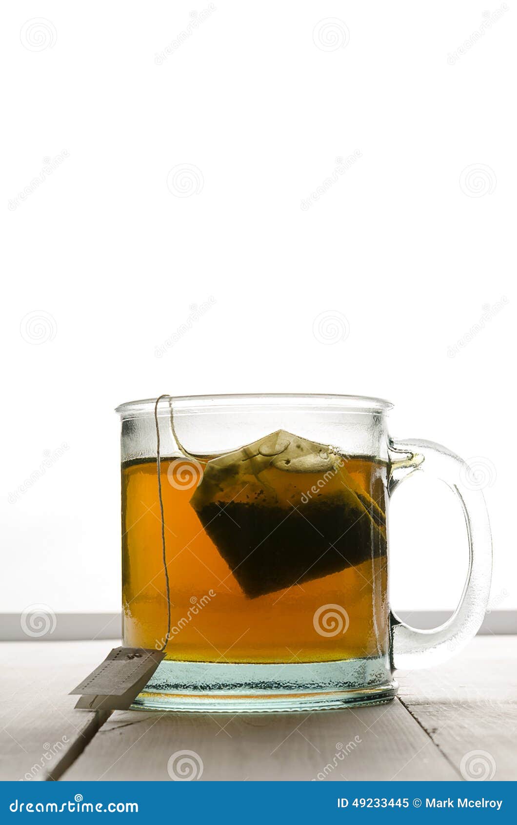 Tea Back Lit with Tea Bag Portrait View Stock Image - Image of warm ...