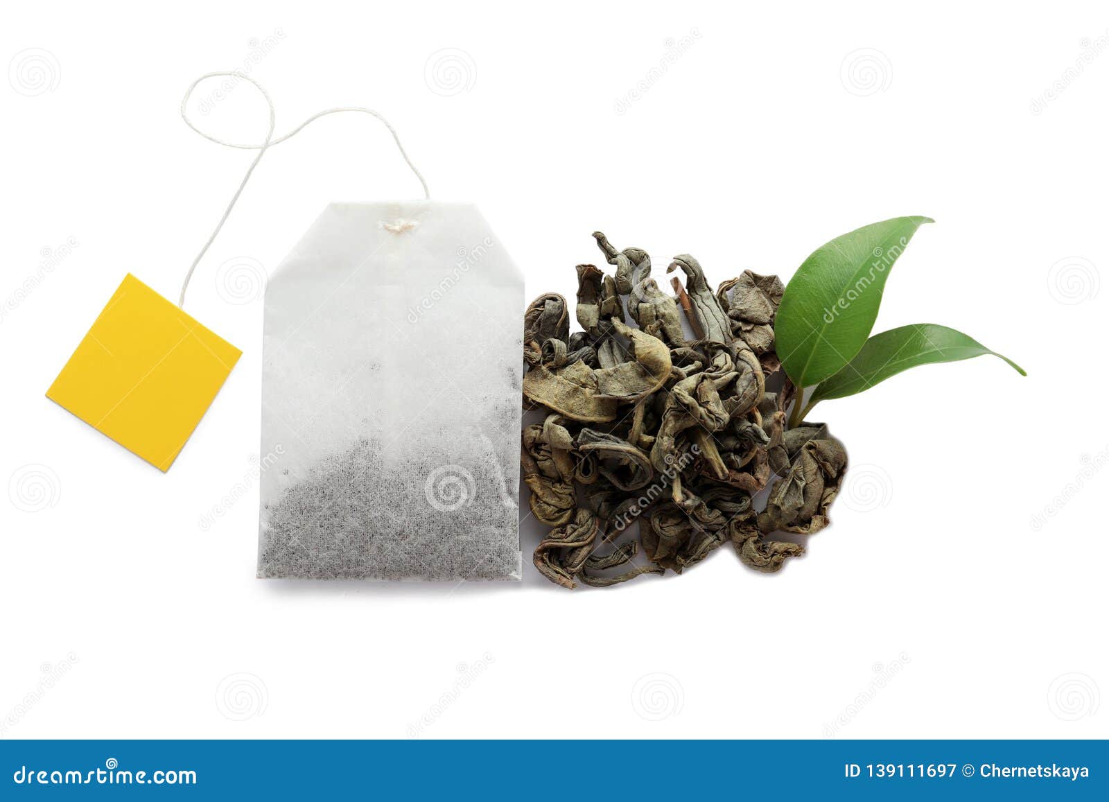 Tea Bag and Dry Leaves on White, Top View Stock Image - Image of ...