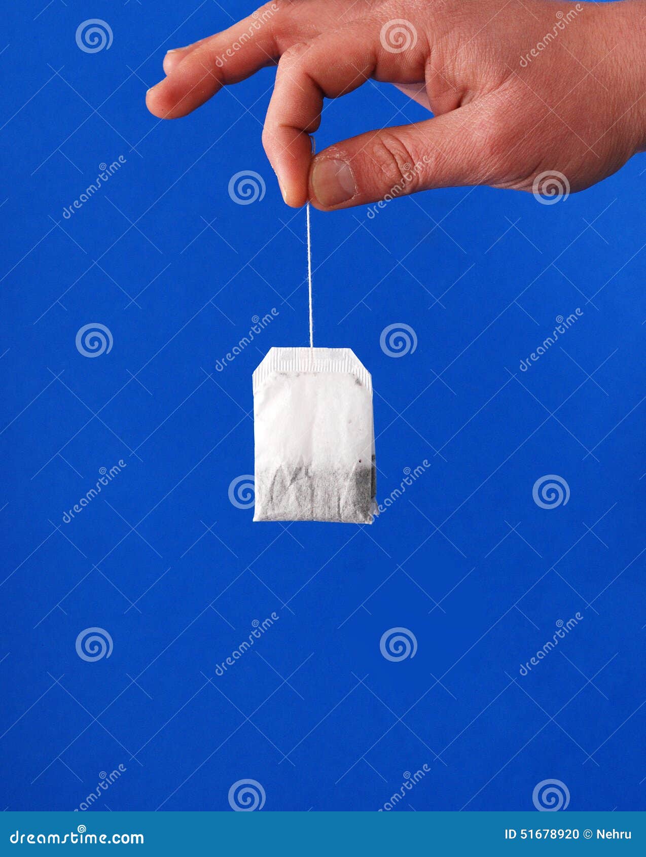 Tea bag stock photo. Image of hold, fingers, beverage - 51678920