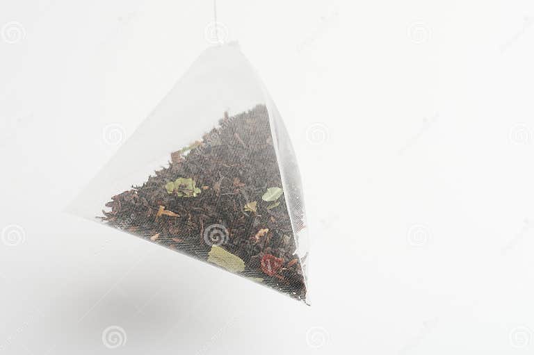 Tea bag pyramid shape stock photo. Image of petal, pyramid - 219957886